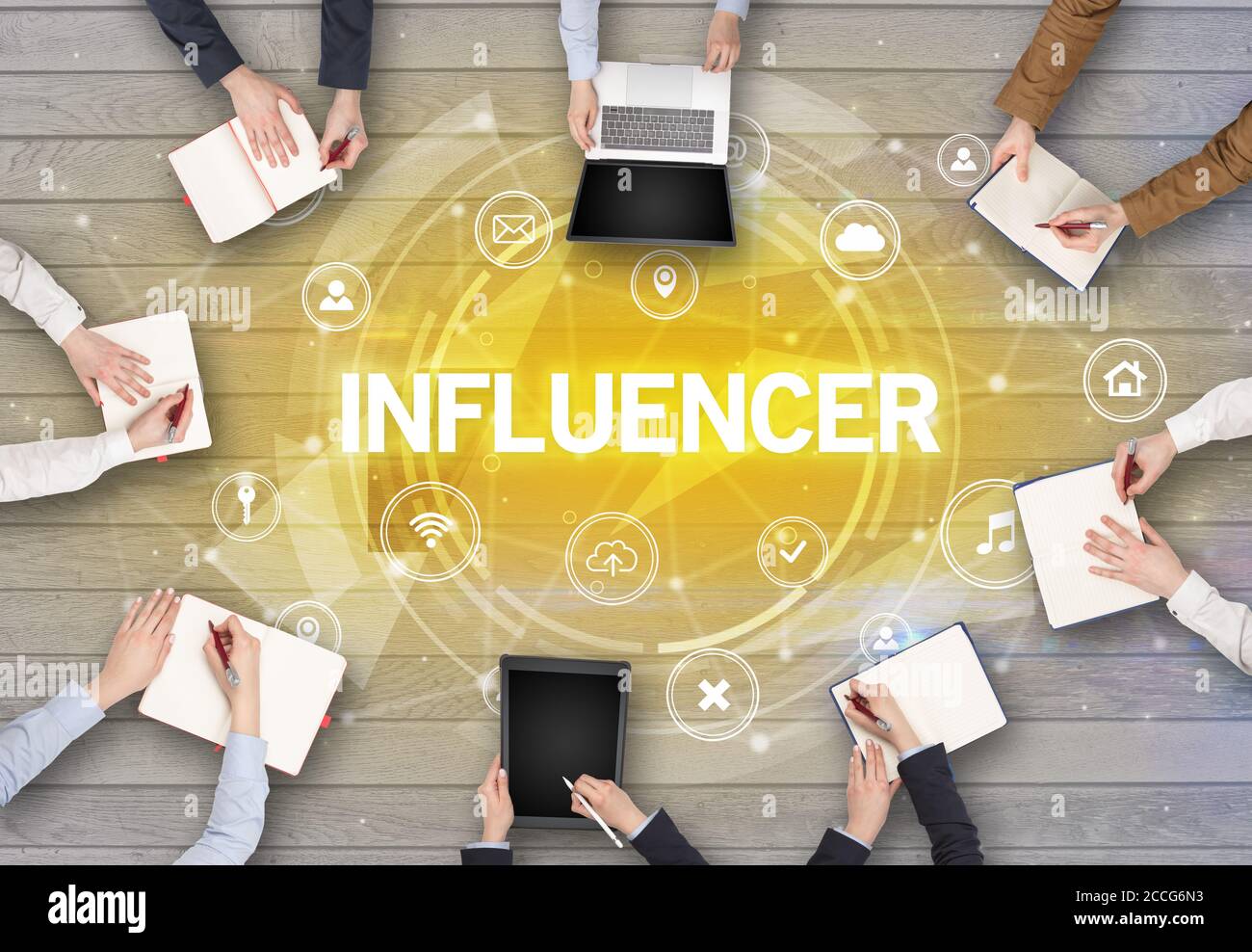 Group of people having a meeting with INFLUENCER insciption, social ...