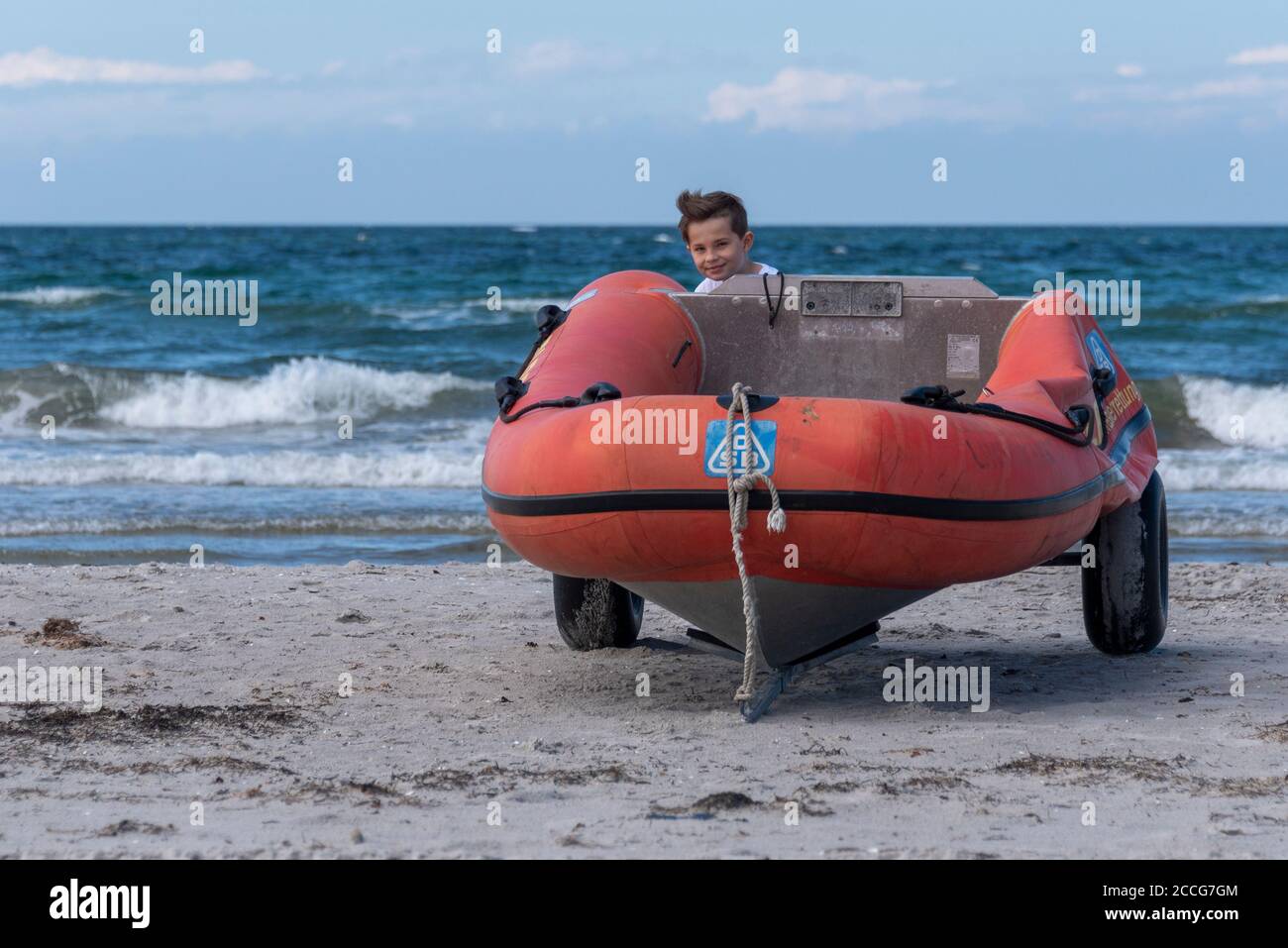 Boy, inflatable boat, Baltic Sea, Hiddensee Stock Photo - Alamy