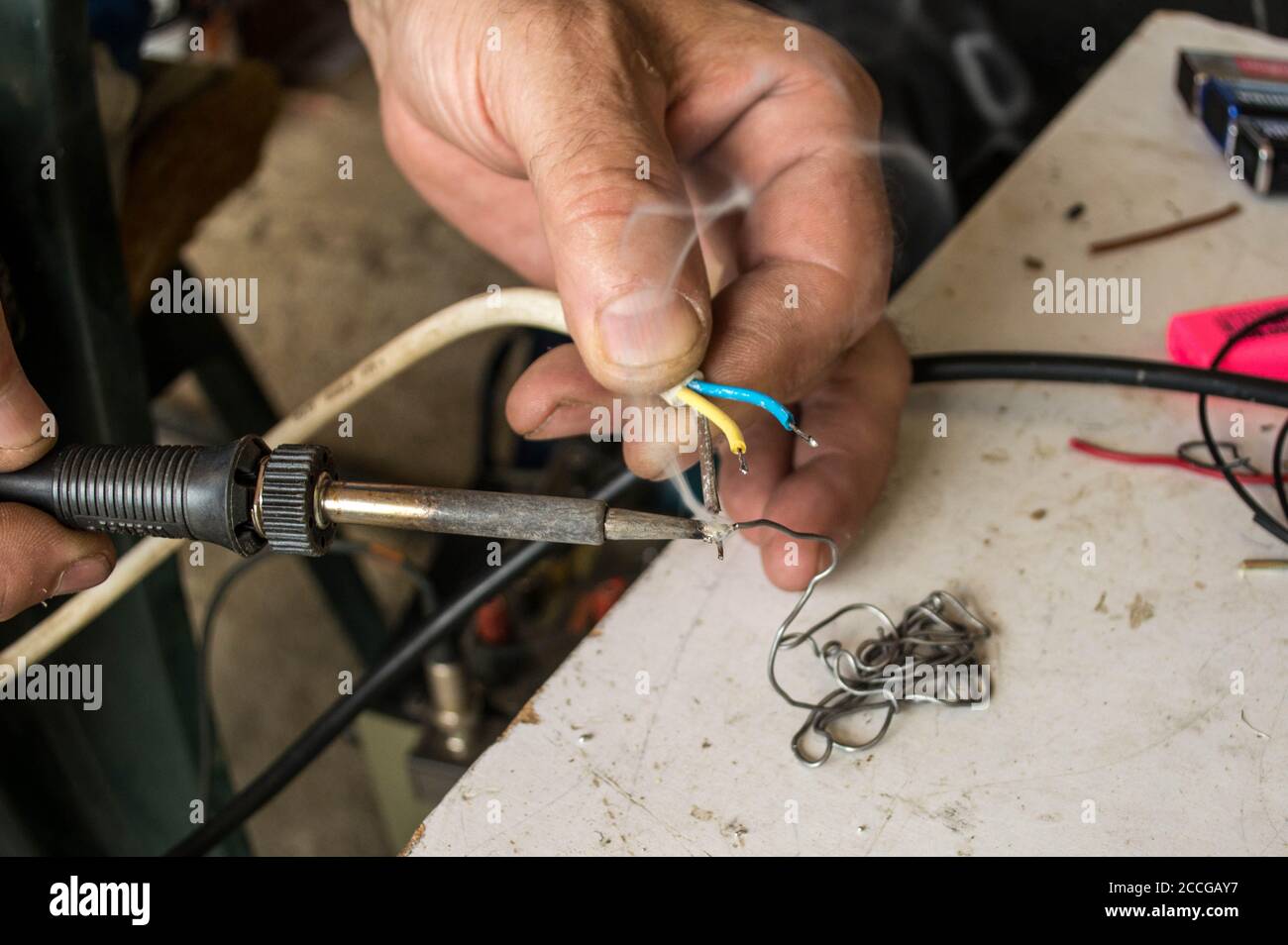 Manual work, soldering Stock Photo - Alamy