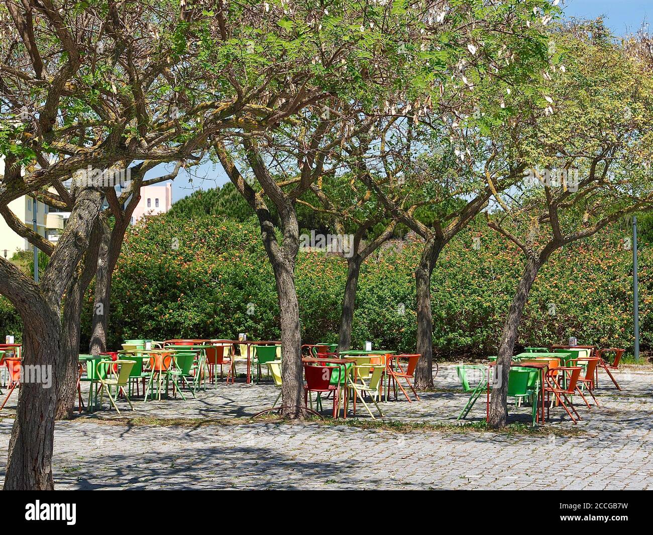 Empty cafe at Passeio do Tejo in Lisbon with view on the Vasco da Gama ...