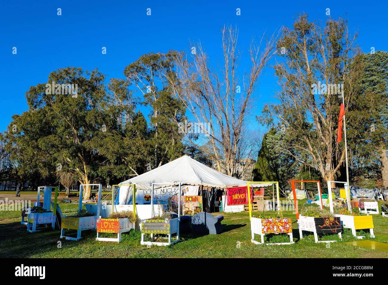 The Aboriginal tent embassy with canvas tents and protest signs ...