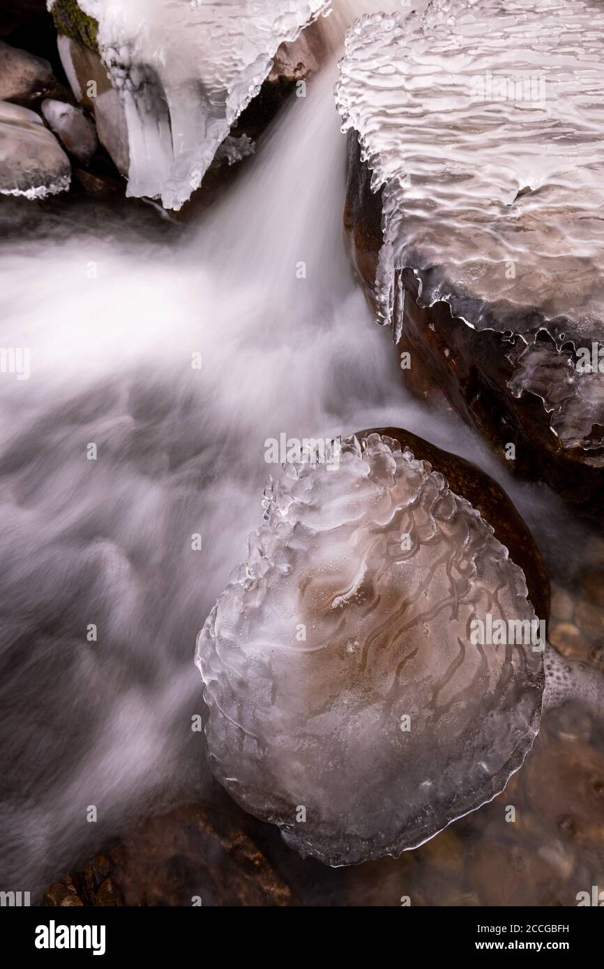 Stream with rapids in the so-called cow escape in winter with snow and ...