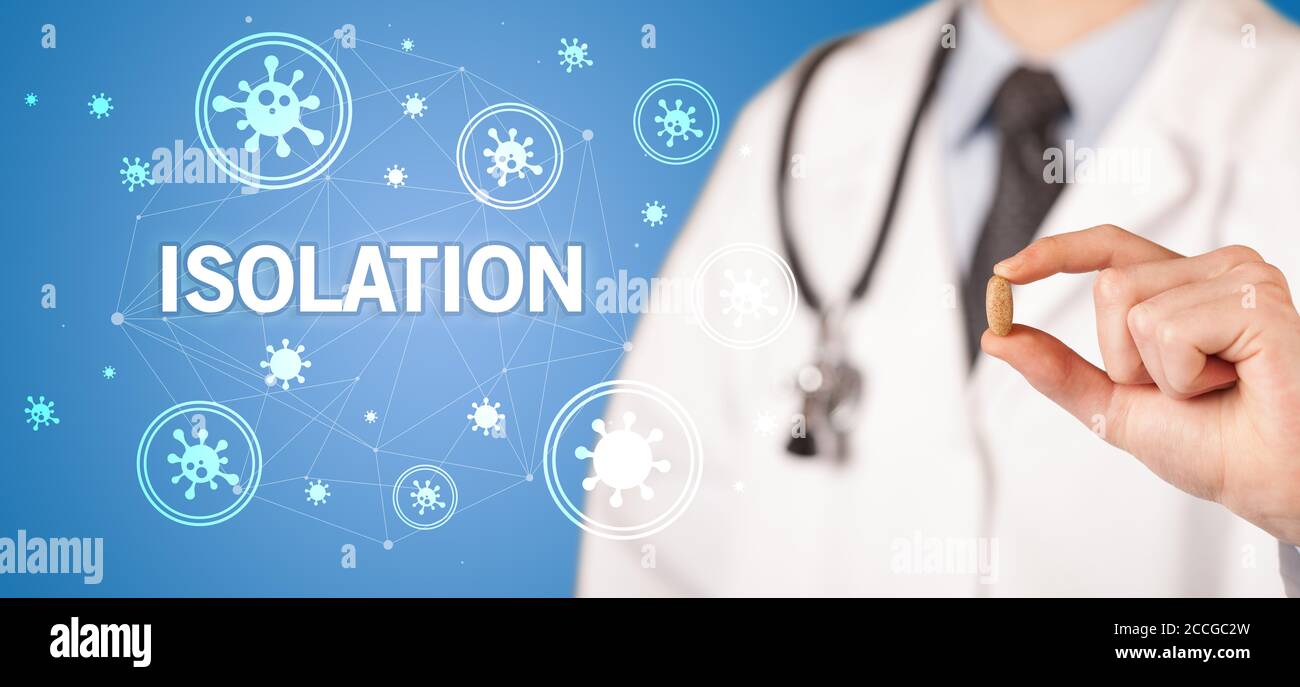 Doctor giving pill with ISOLATION inscription, coronavirus concept ...