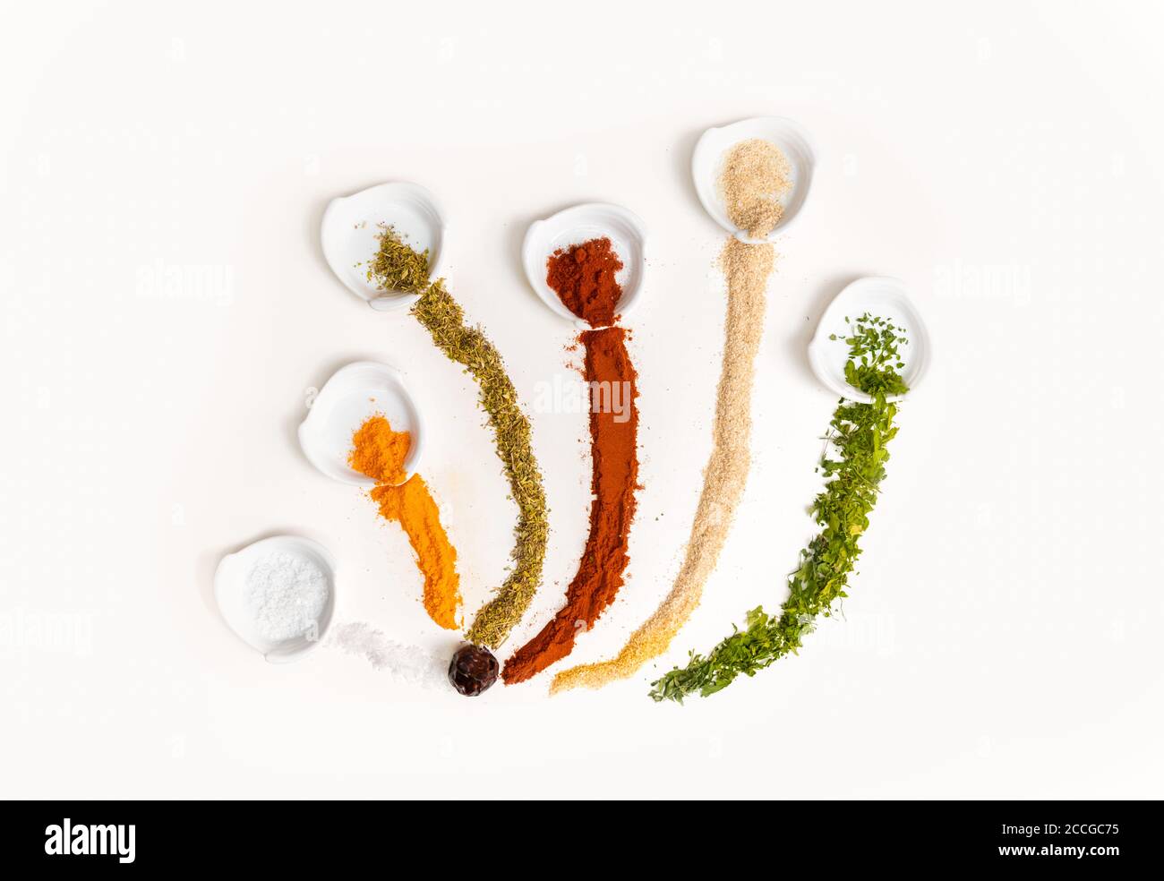 Top view of various spices on a white background Stock Photo - Alamy