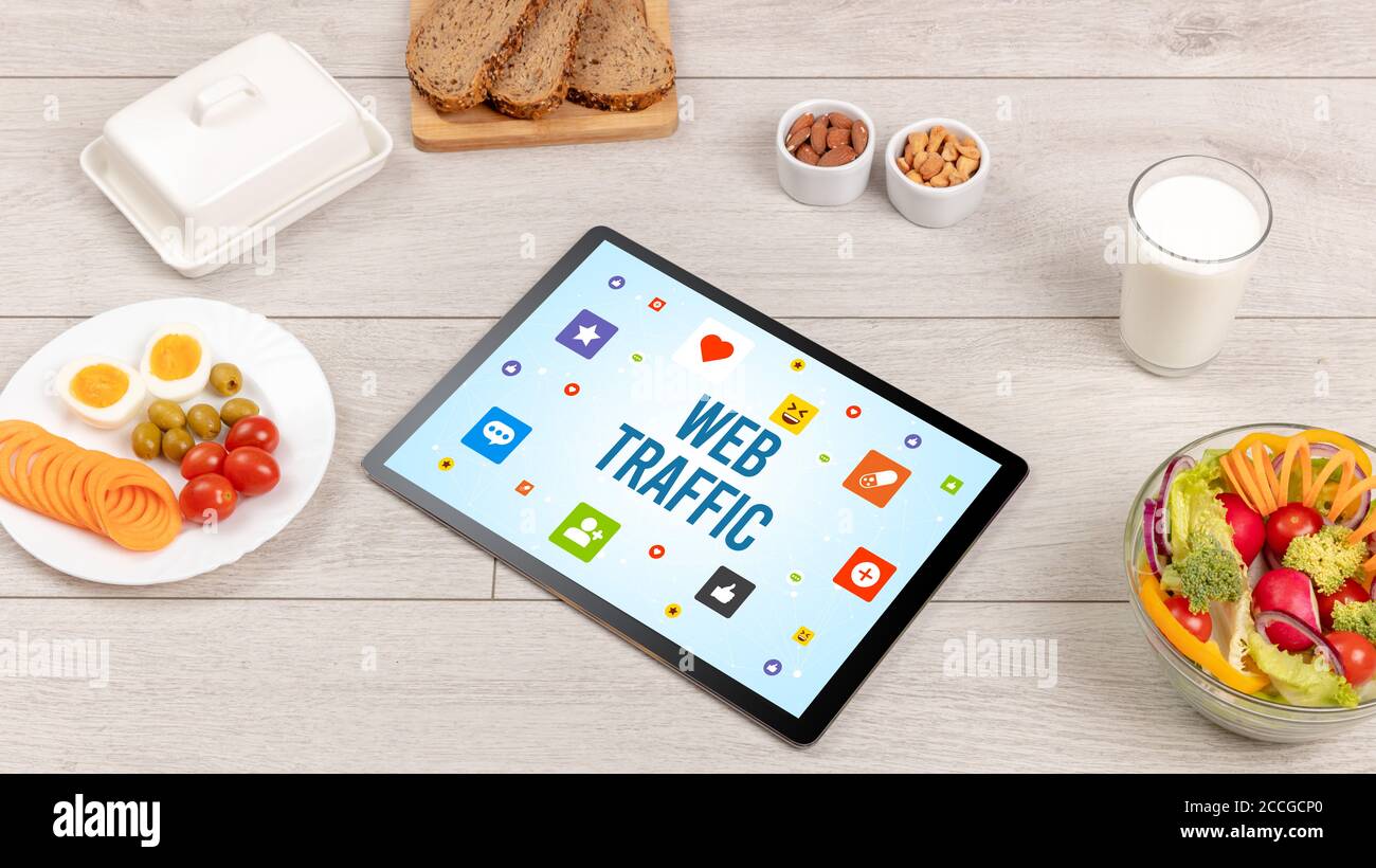 Healthy Tablet Pc compostion with WEB TRAFFIC inscription, Social ...
