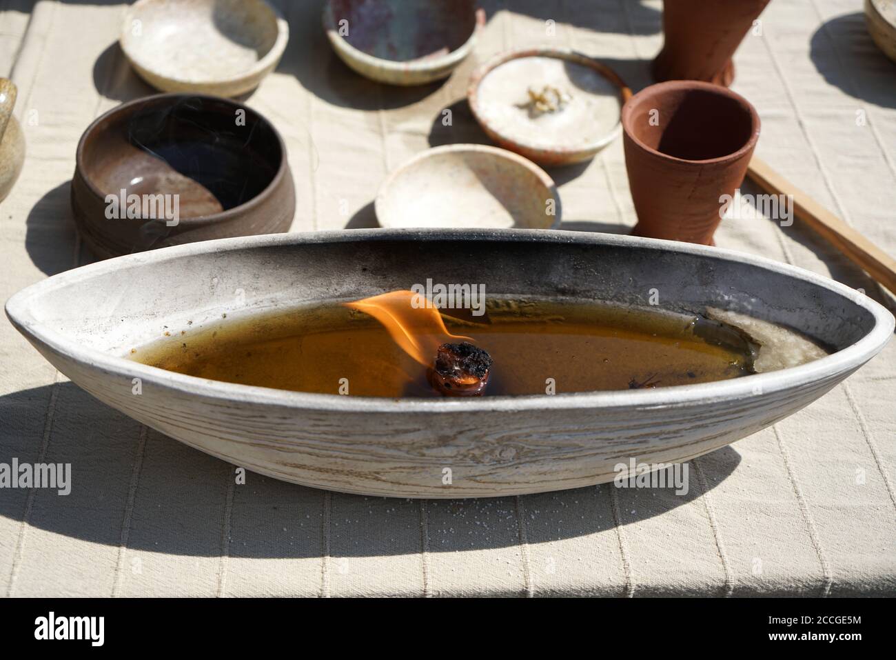 Closeup shot of a fire burning on a bowl with oil Stock Photo - Alamy