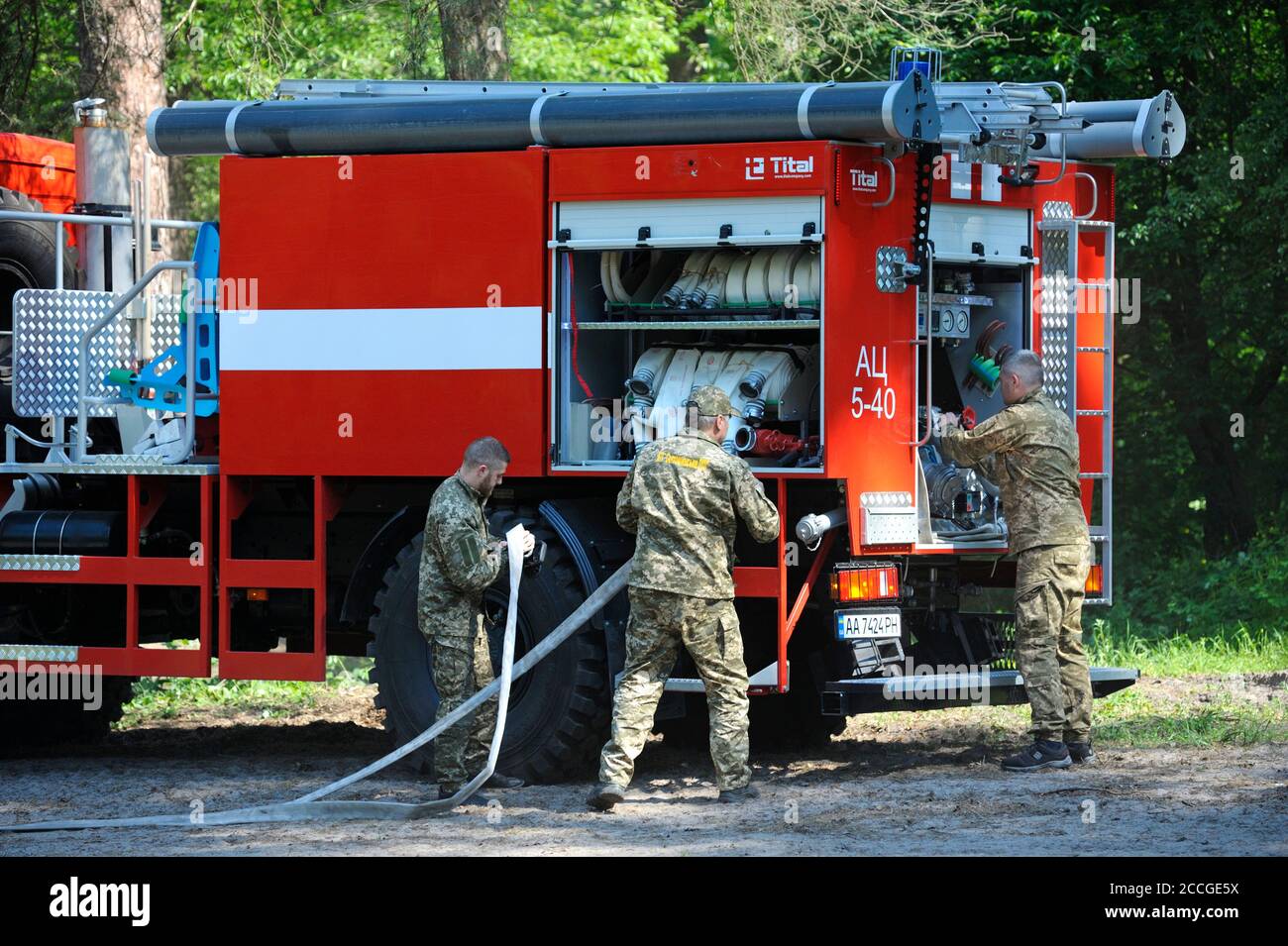 Fire fighting team vehicle hi-res stock photography and images - Alamy