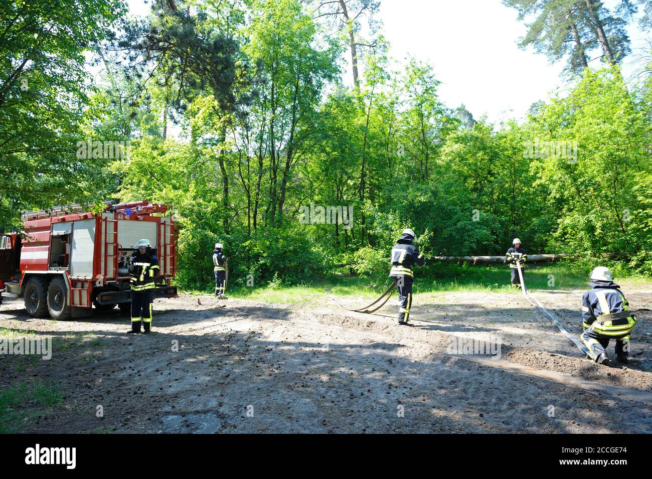 Fire fighting team vehicle hi-res stock photography and images - Alamy