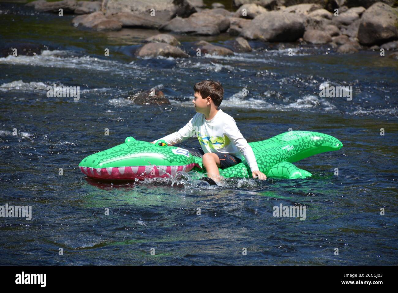 Kids enjoying tubing in rapids on the Mattawa River, Ontario Stock ...
