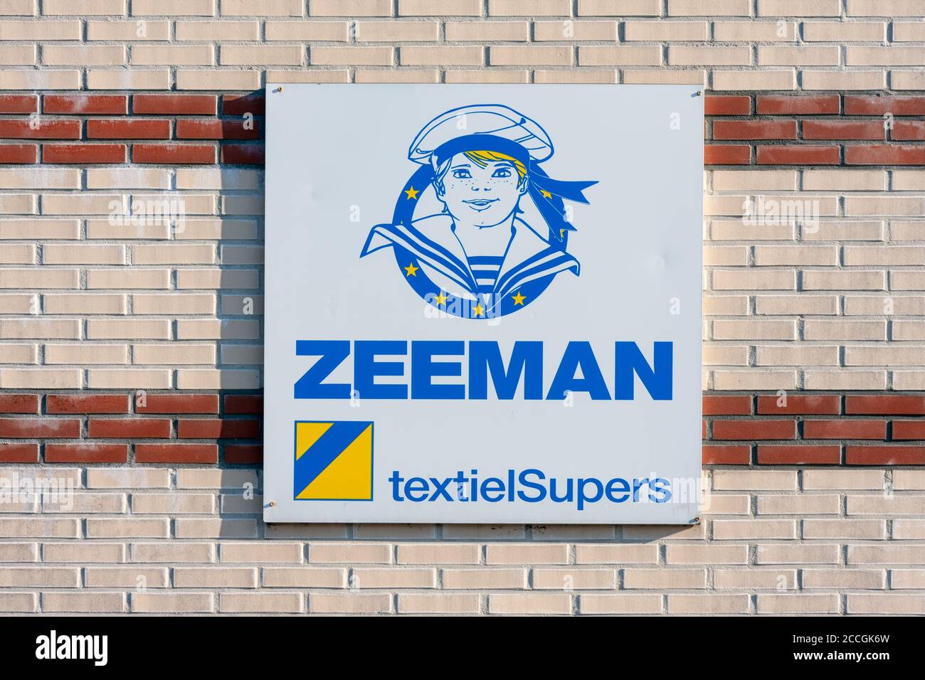 Brick wall with billboard of Dutch clothing store Zeeman Stock Photo ...