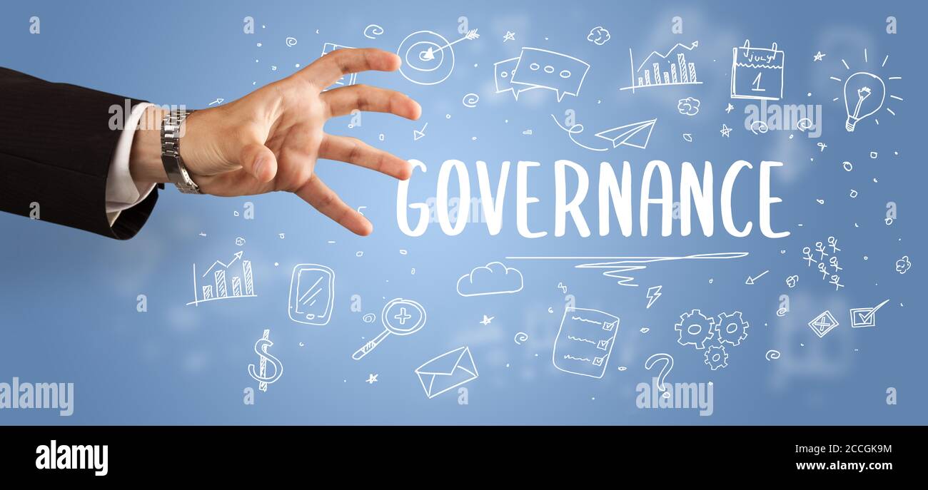 Close-Up of cropped hand pointing at GOVERNANCE inscription, modern ...
