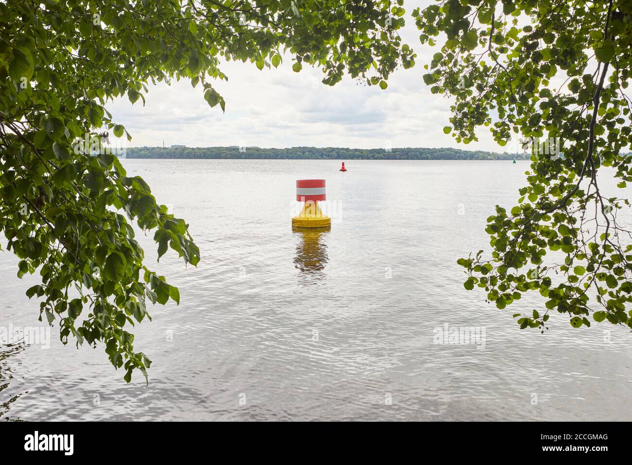 Sea mark, lake, barrel, red-white Stock Photo - Alamy