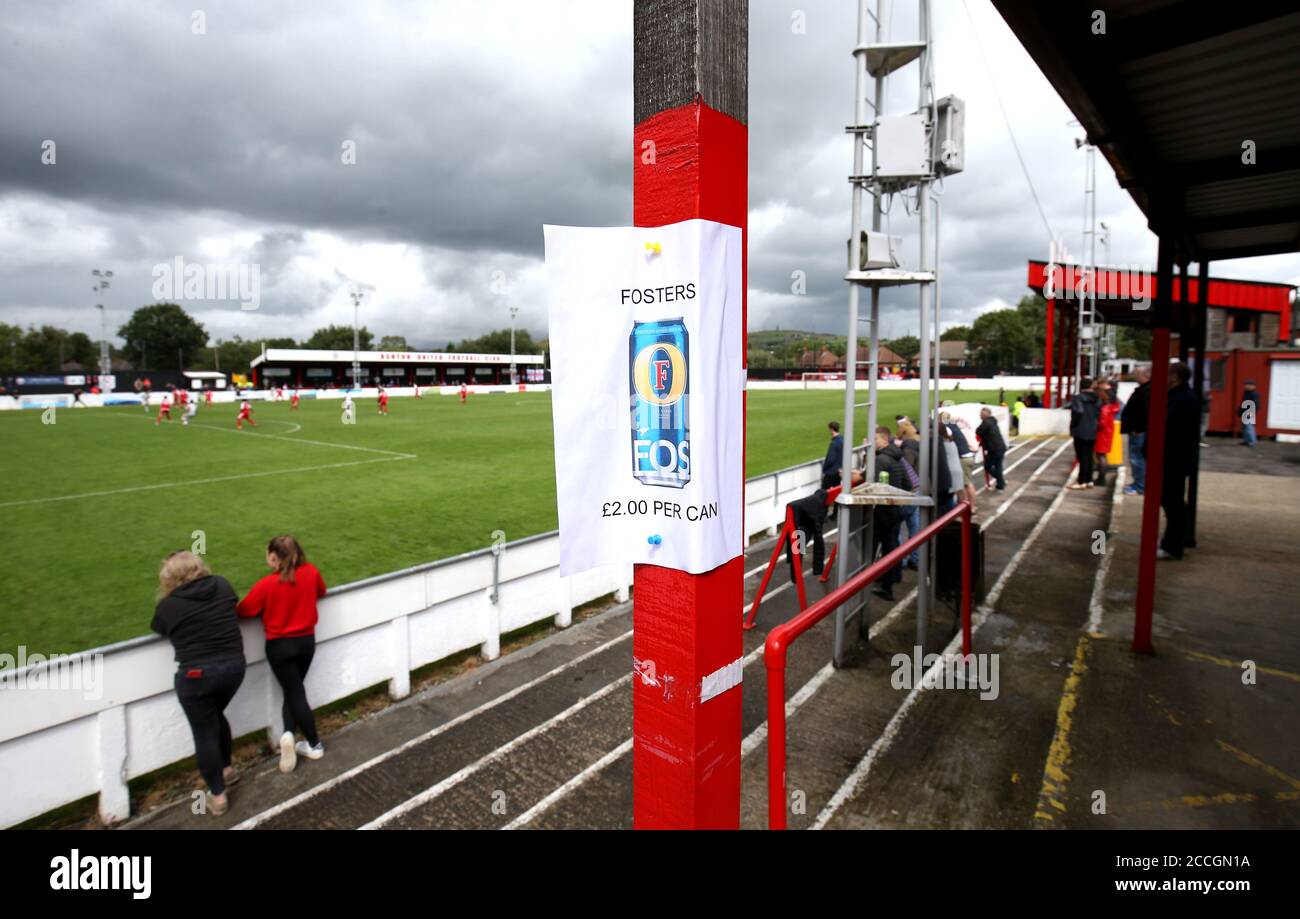 A general view of signage advertising refreshments as fans watch the ...