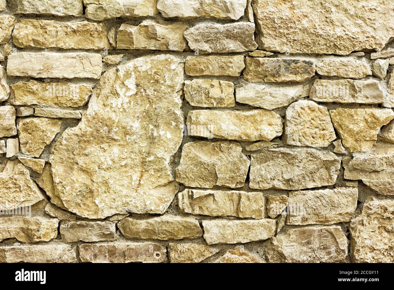 texture background wall made of stone, tinted photo Stock Photo - Alamy