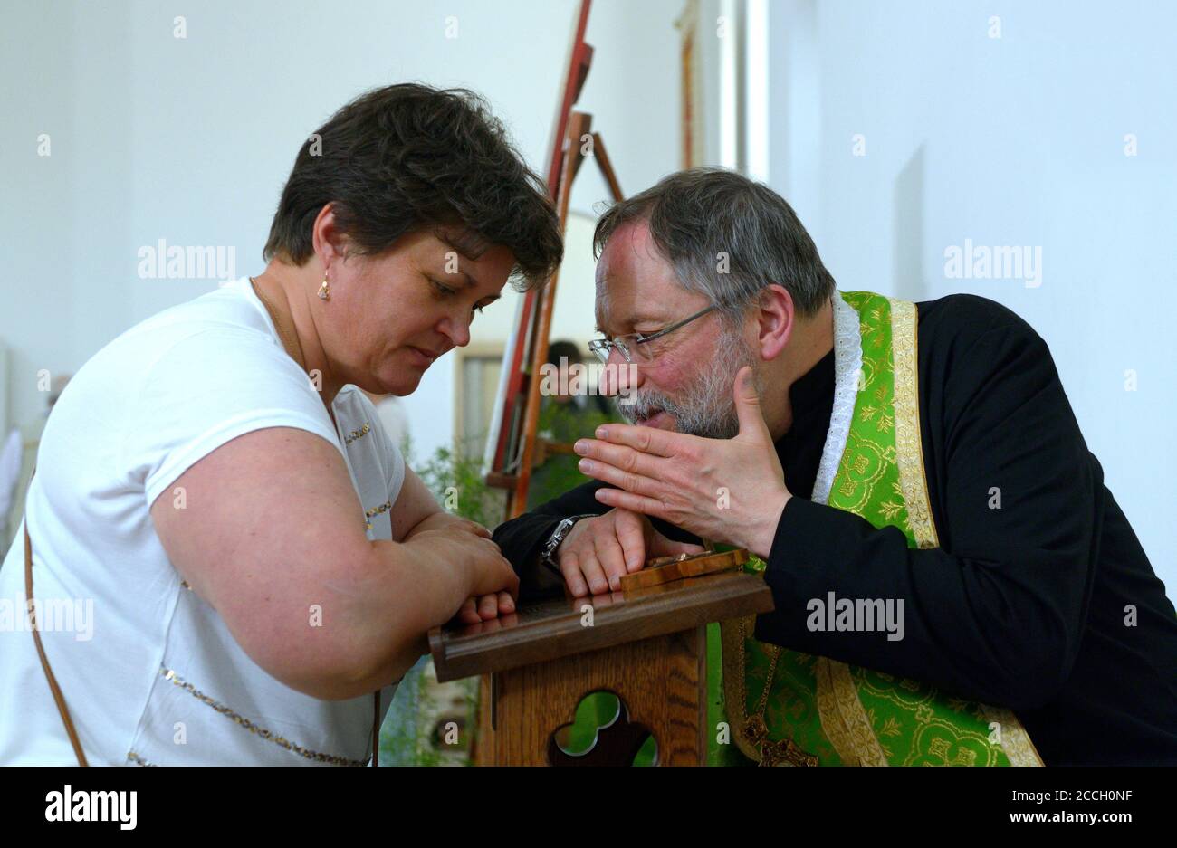 Catholic priest confession hi-res stock photography and images - Alamy