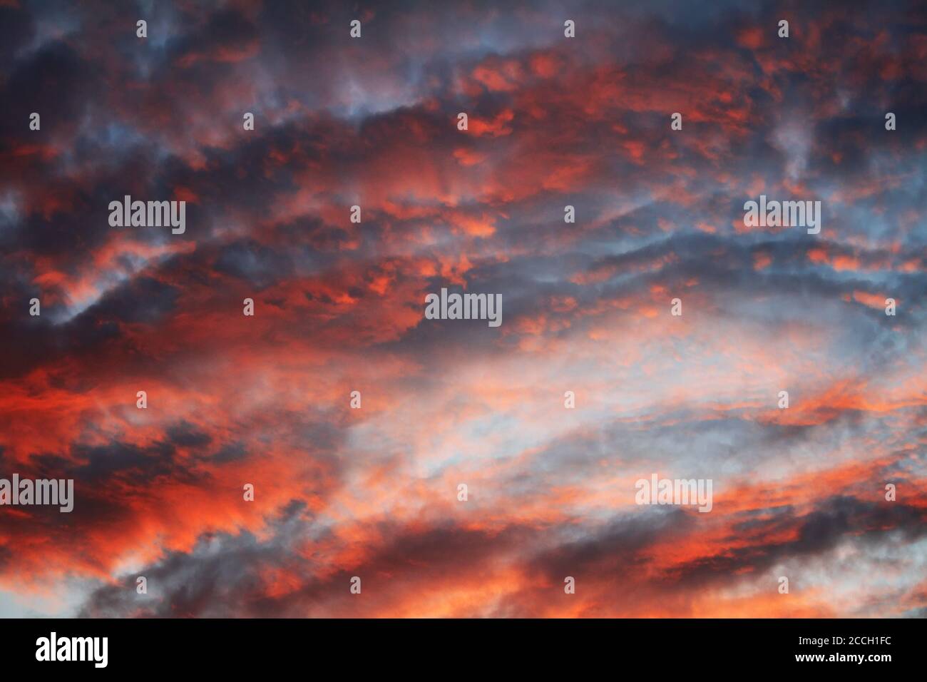colorful abstract background with red clouds in the sky at sunset Stock ...