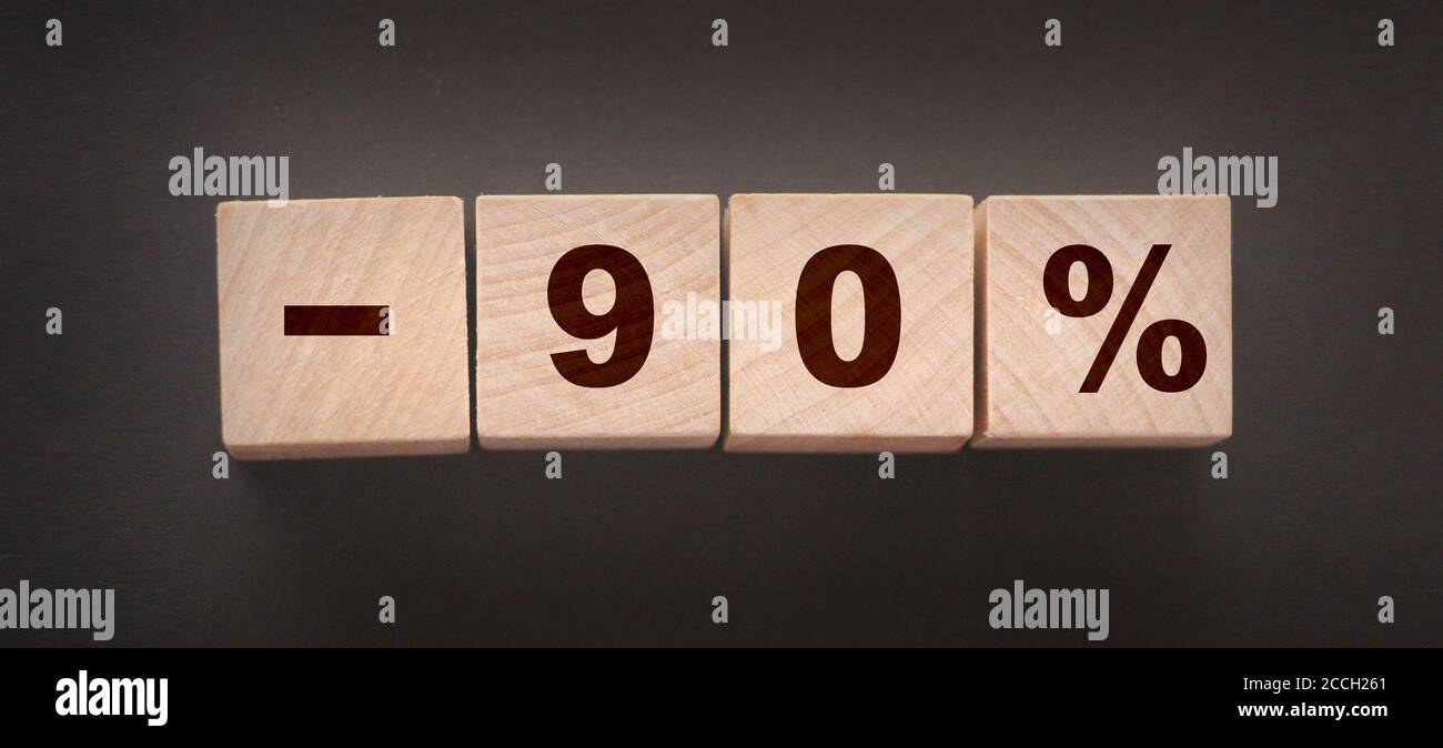 90% on wooden blocks on black background. Sale business concept Stock ...