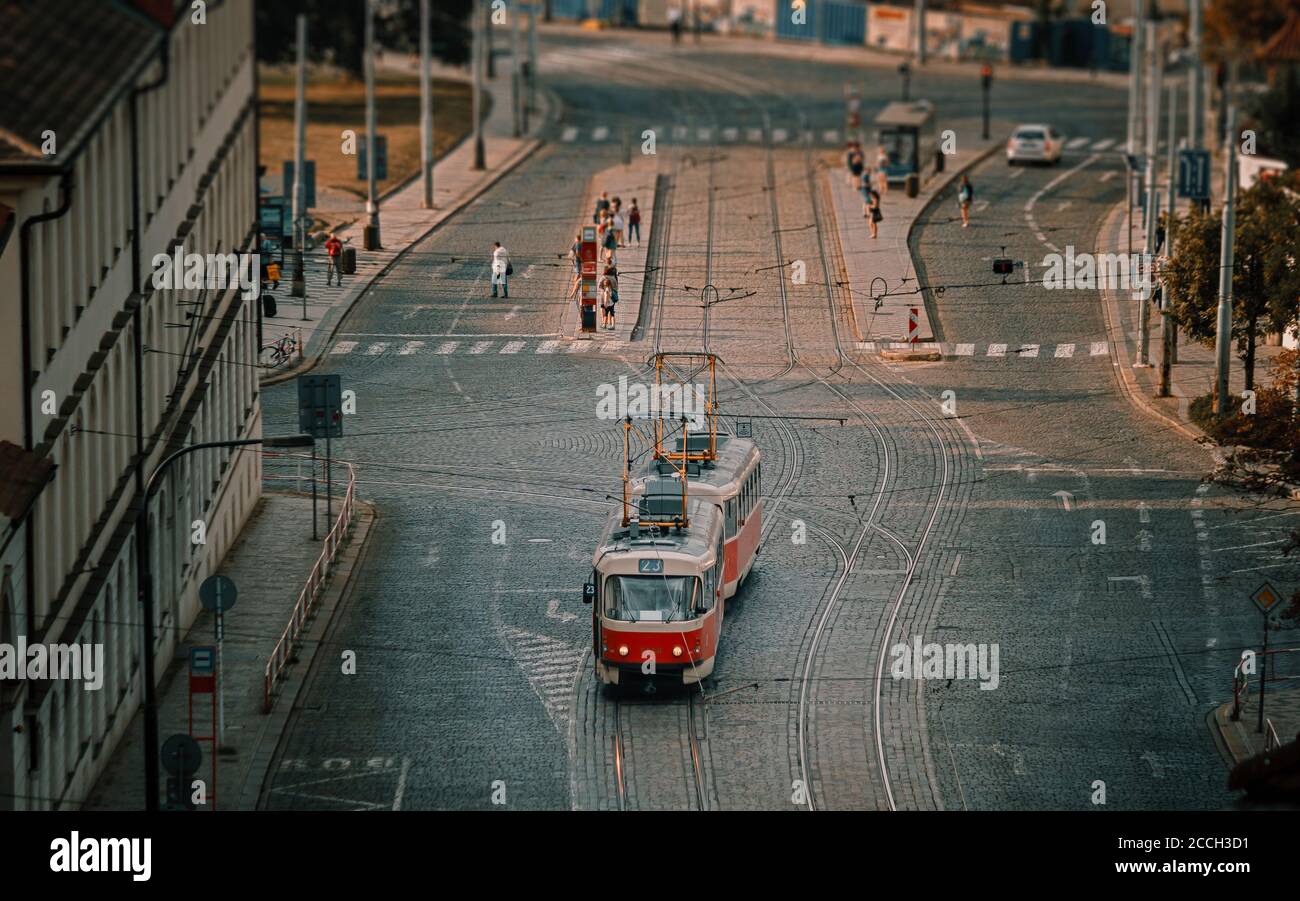 Vintage Prague tram in the city center. Cobblestone tram tracks. The ...