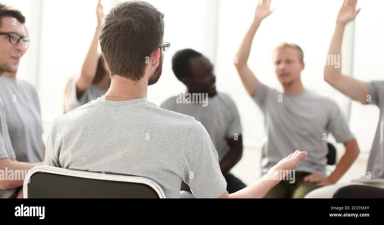 young people ask questions during the meeting Stock Photo - Alamy