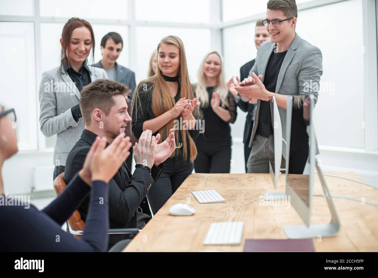 close up. business team applauding their overall success Stock Photo ...
