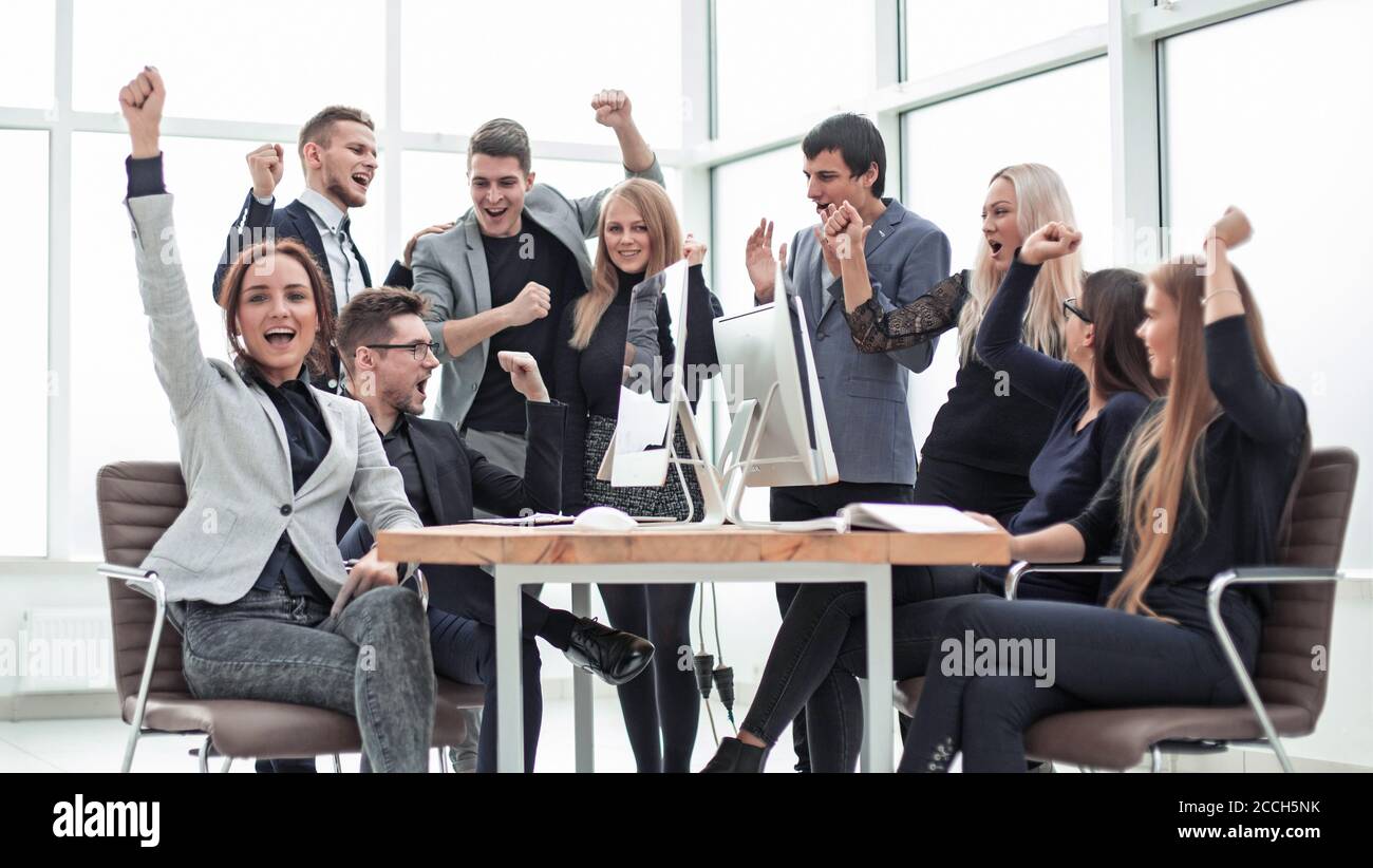 happy business team showing their success in the workplace Stock Photo ...