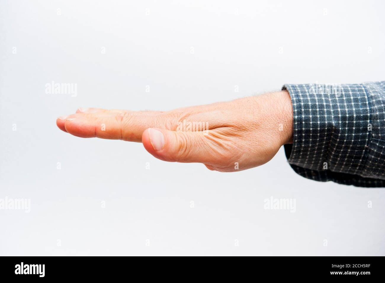 hand in gesture for the game of rock paper scissors, paper gesture ...