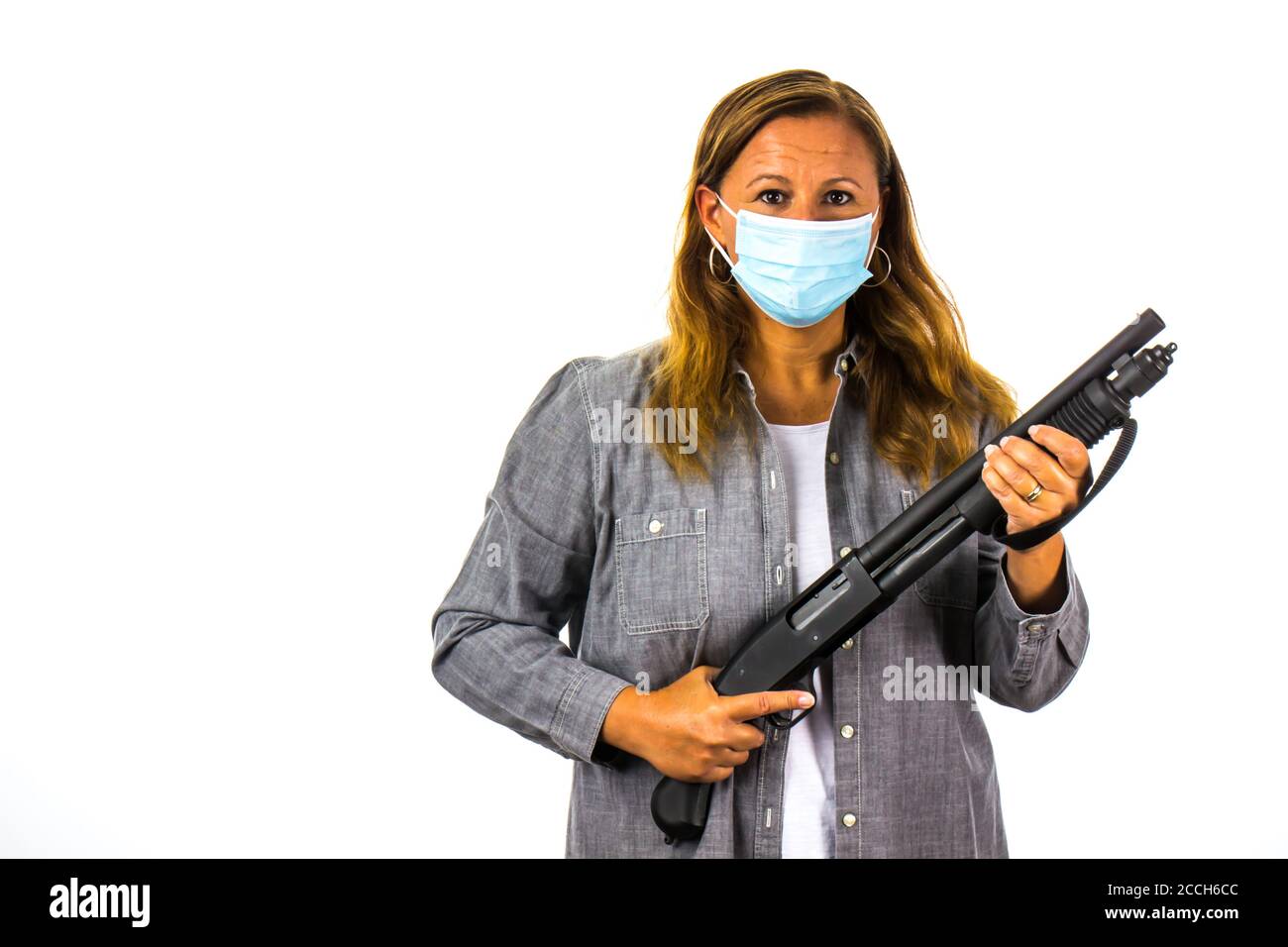 Mom With Face Mask During Corona Virus Epidemic Armed With Small ...
