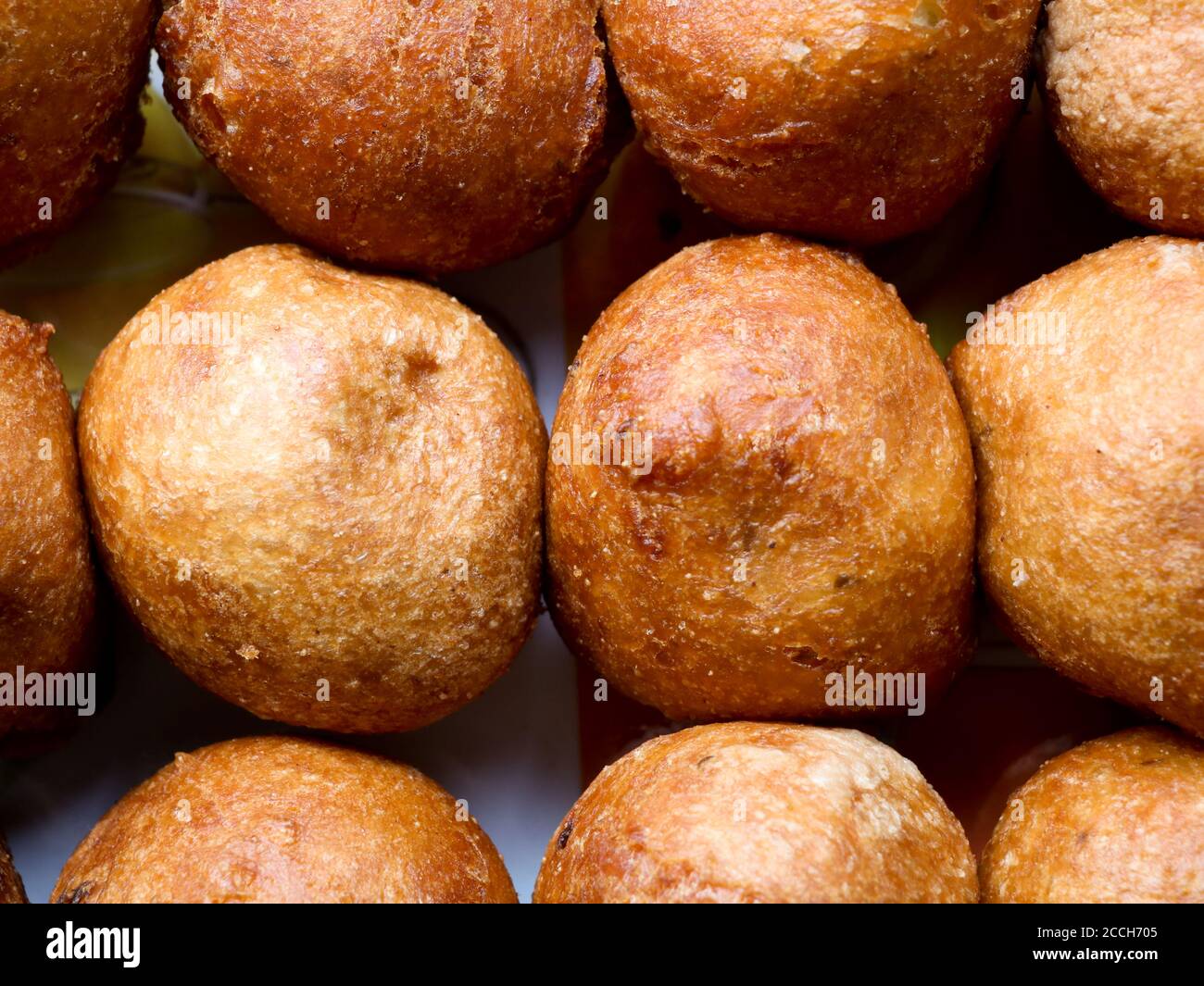 Bonda, a traditional Kerala tea time snack made of maida or wheat flour ...