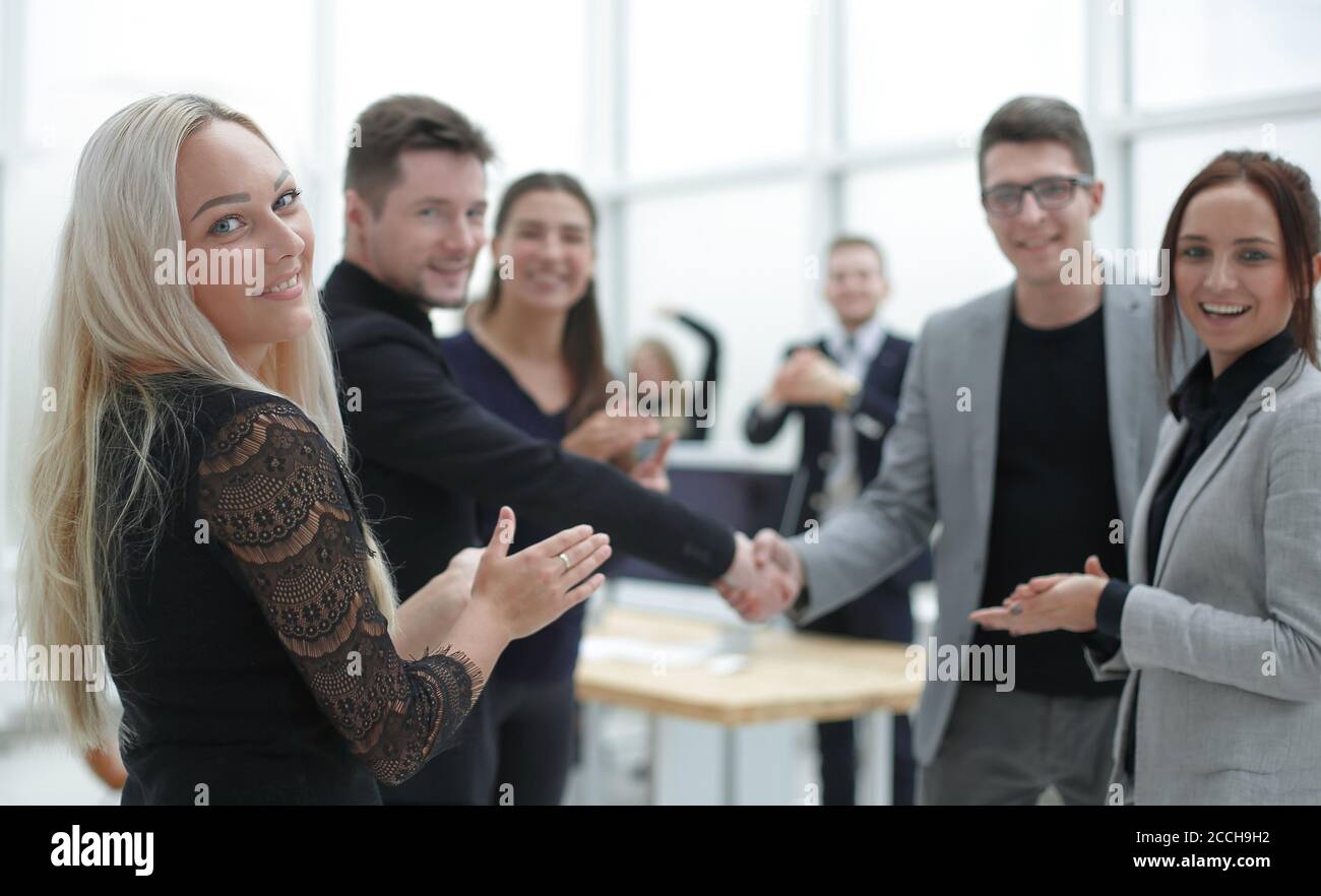 Group diverse professionals shaking hands hi-res stock photography and ...