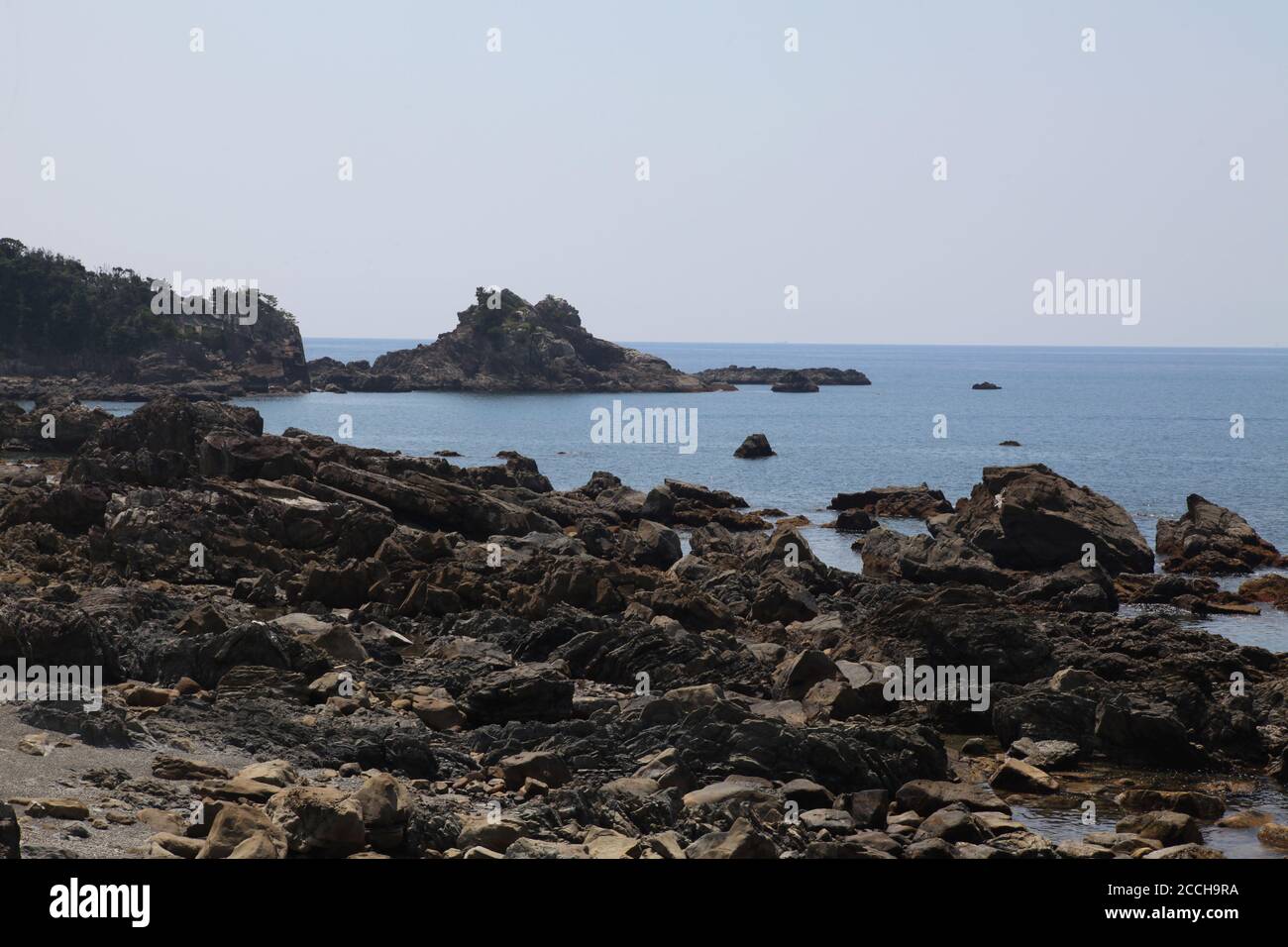 Beautiful rocky shoreline calm blue hi-res stock photography and images ...