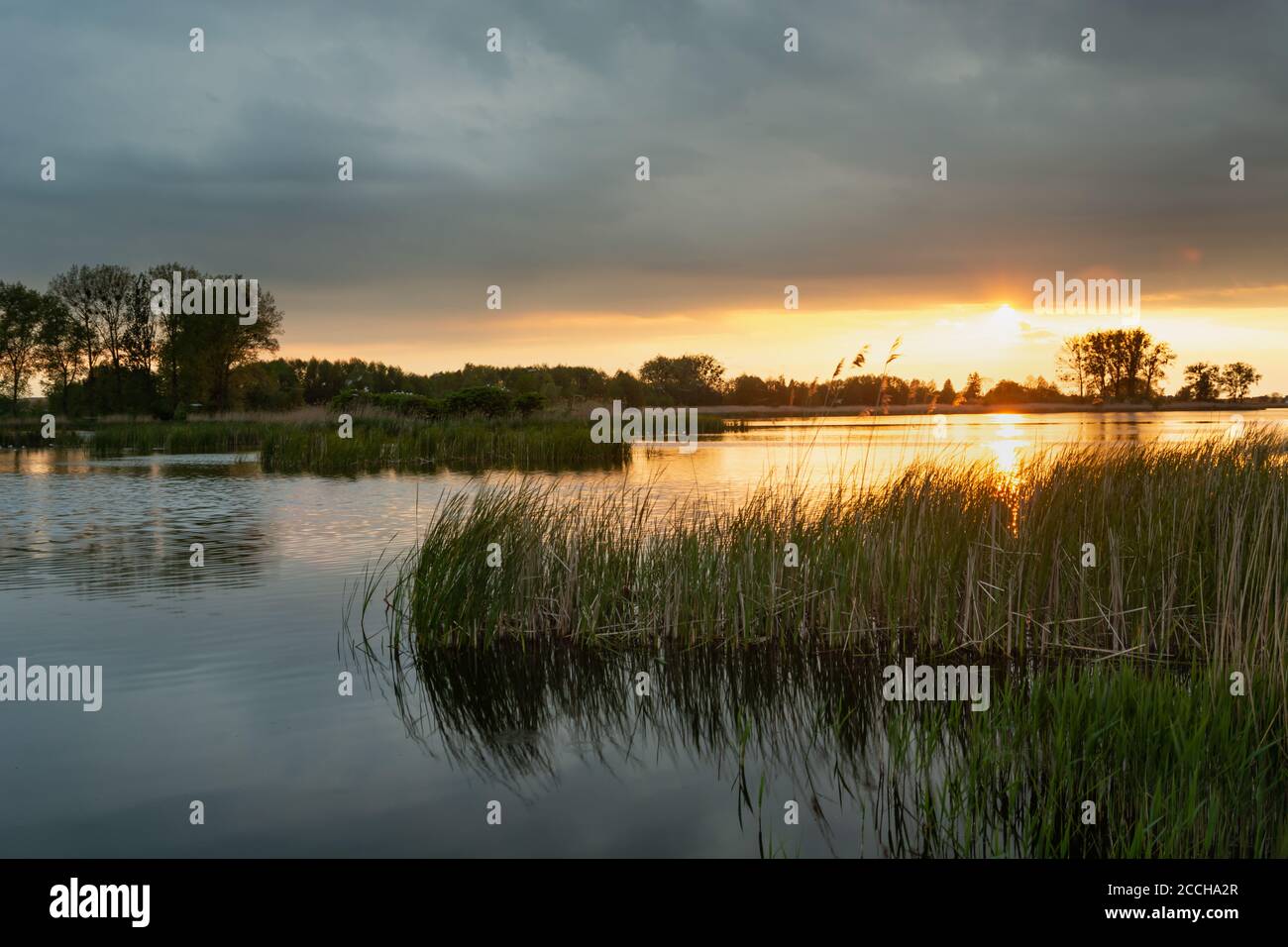 Dark clouds over a lake hi-res stock photography and images - Alamy