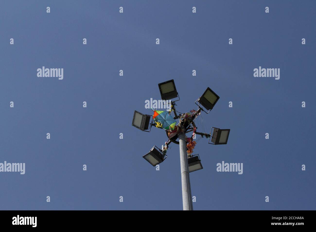 LED lights and a kite. High lighting pole with strong LED lights and a ...