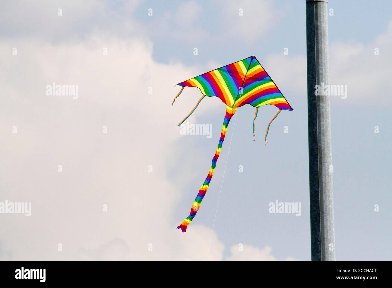 Children's favorite toy kite on windy days in spring, blue sky and ...
