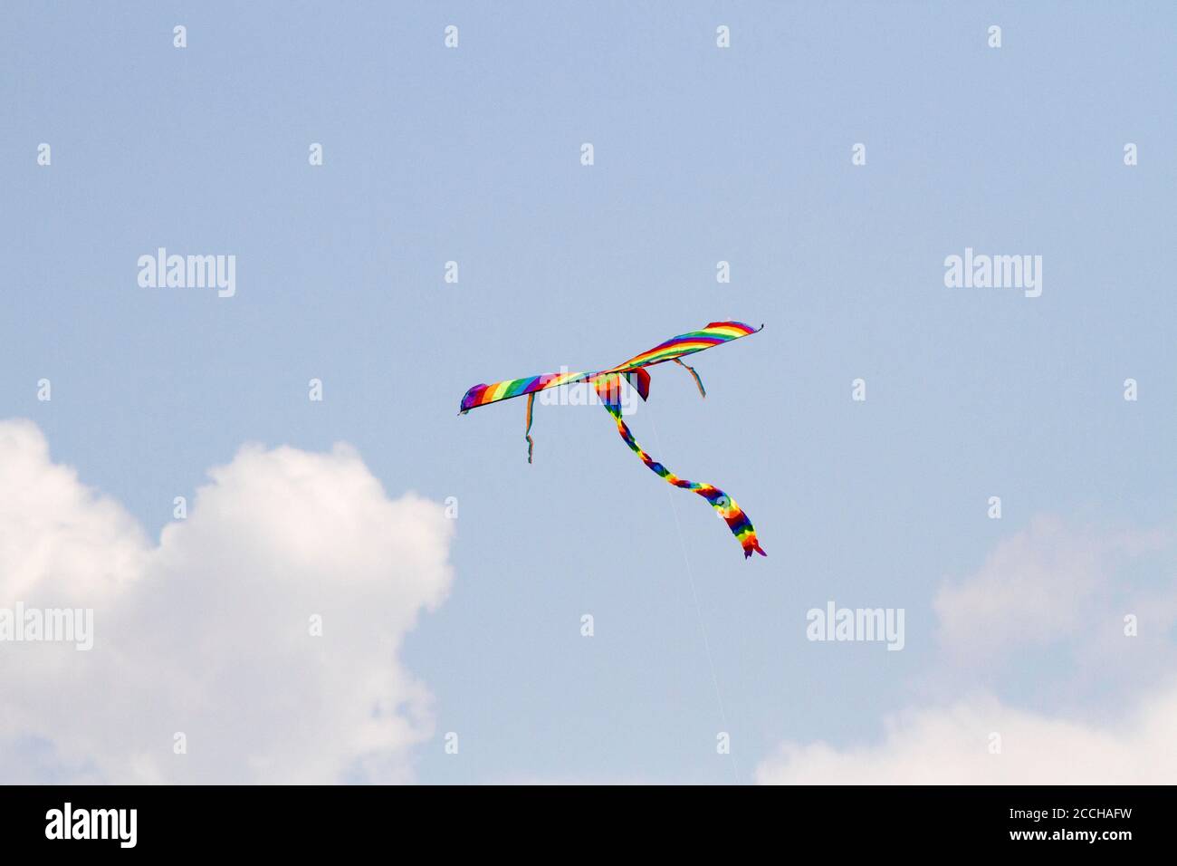 Children's favorite toy kite on windy days in spring, blue sky and ...