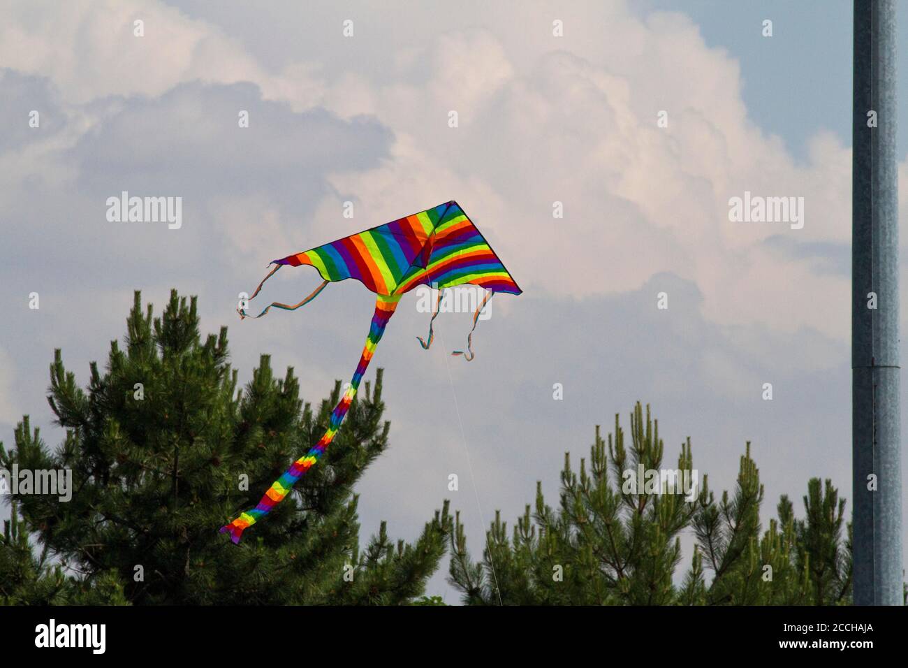 Children's favorite toy kite on windy days in spring, blue sky and ...