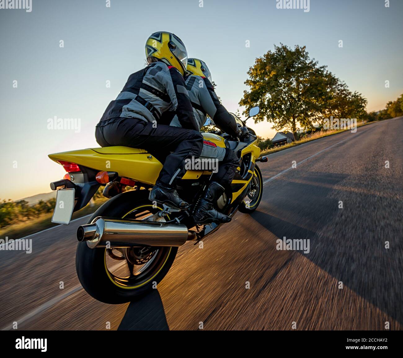 Woman riding on back motorcycle hi-res stock photography and images - Alamy