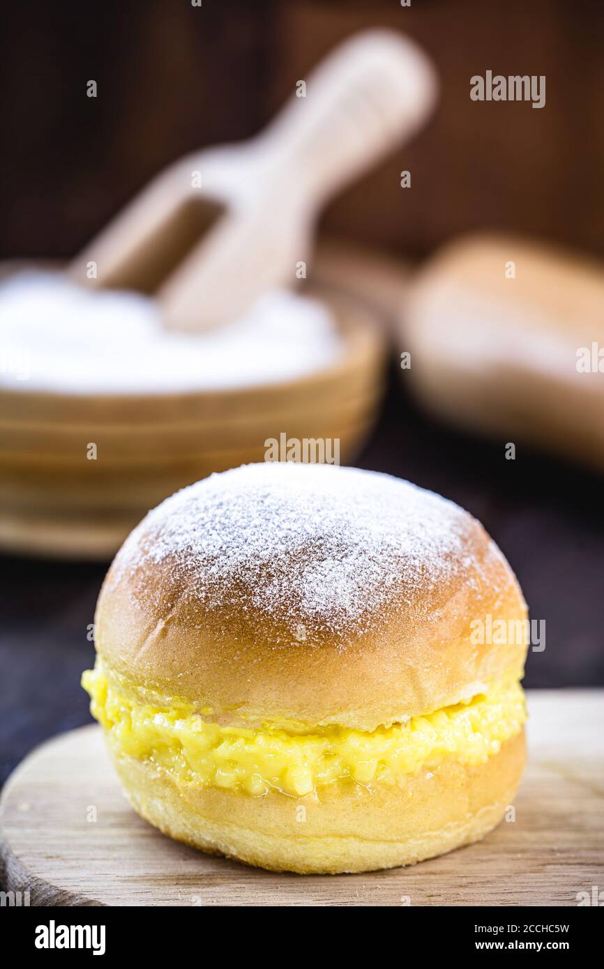 bread with cream and sugar, Brazilian donut called "bakery dream", or ...