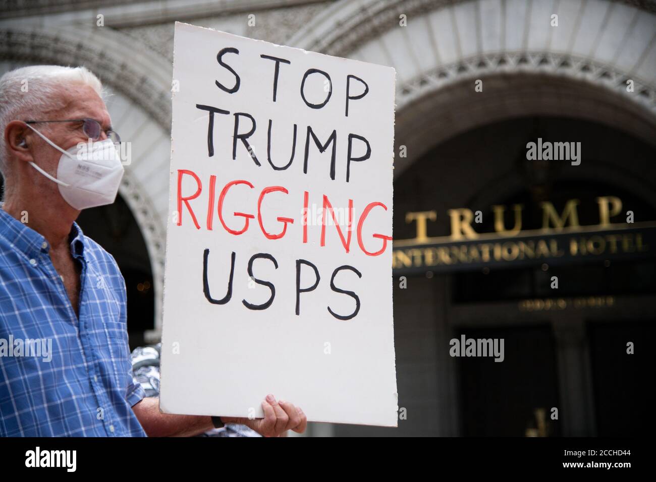 Washington, USA. 22nd Aug, 2020. A demonstrator holds a sign at a ...