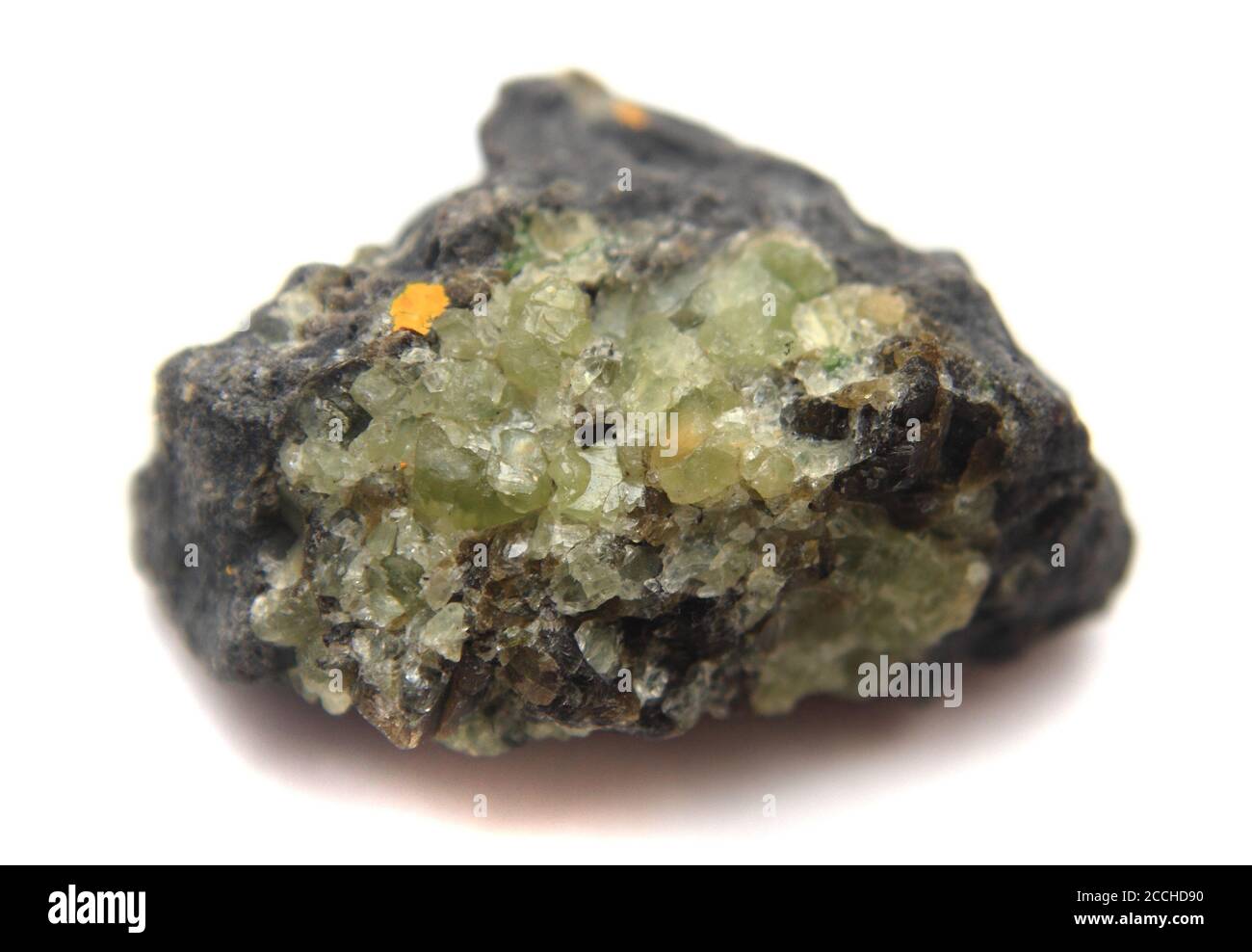 natural olivine mineral isolated on the white background Stock Photo ...