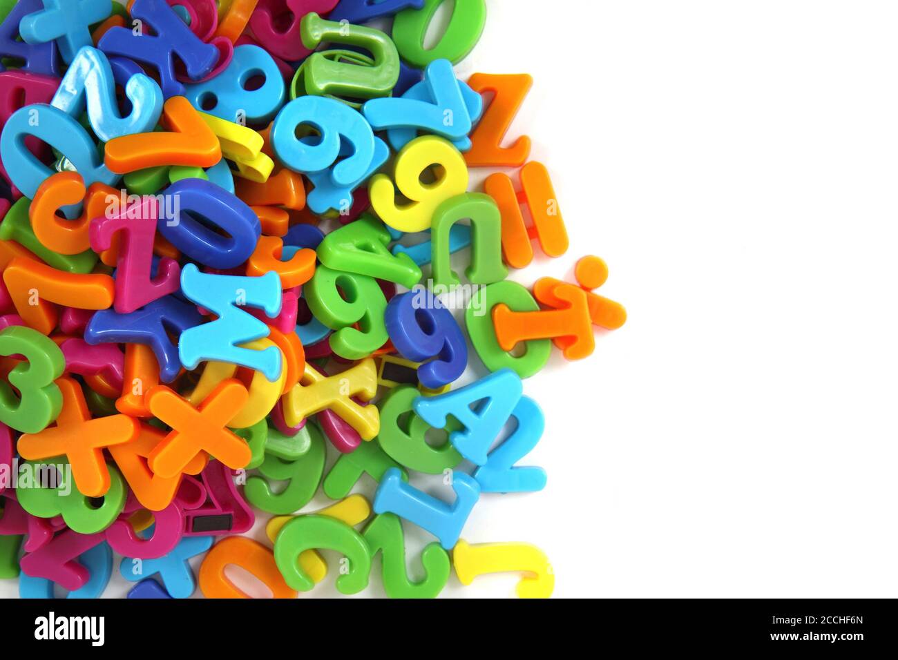 color plastic letters isolated on white background Stock Photo - Alamy
