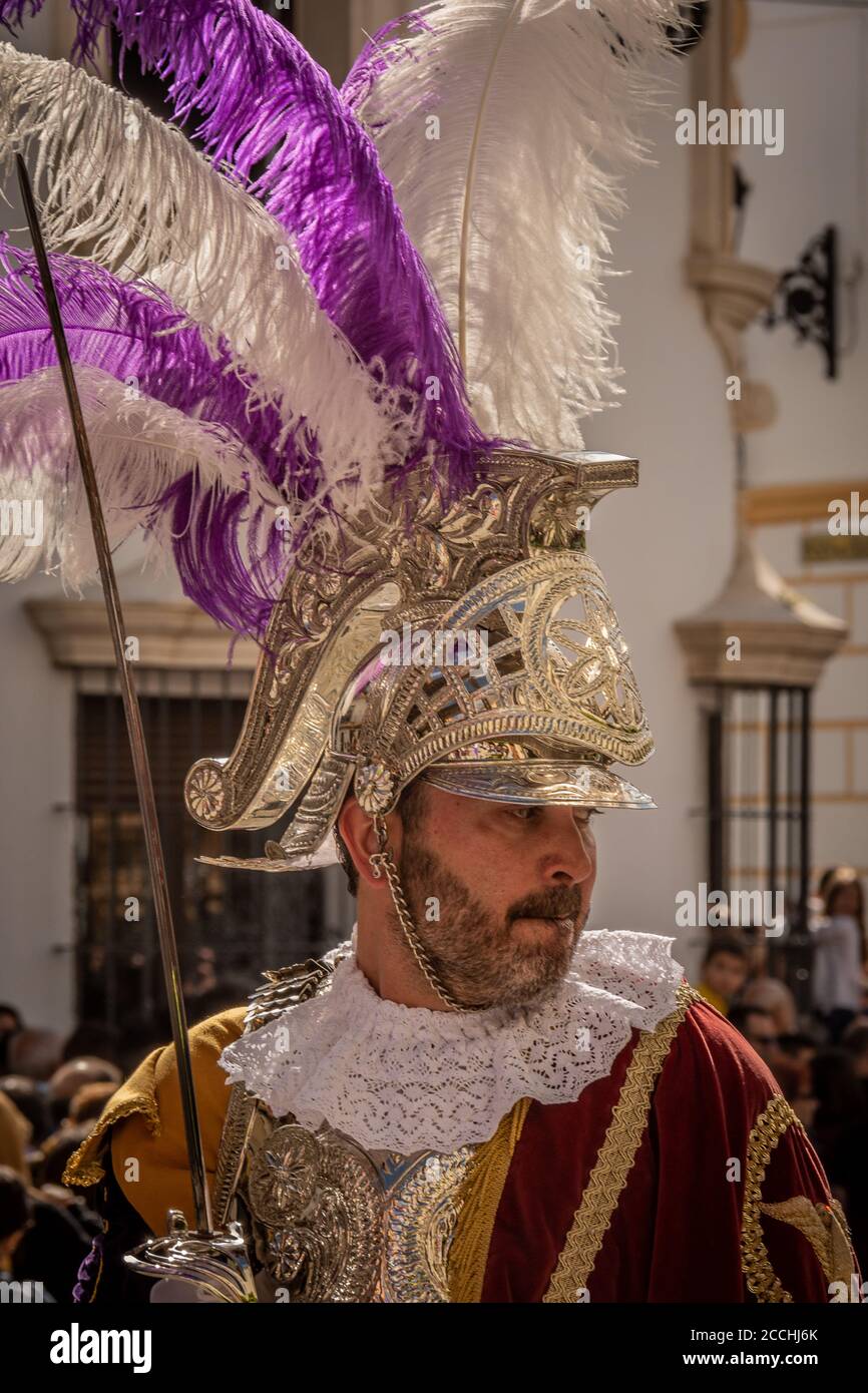 Parade participants wear dress freely inspired by the uniforms of the ...