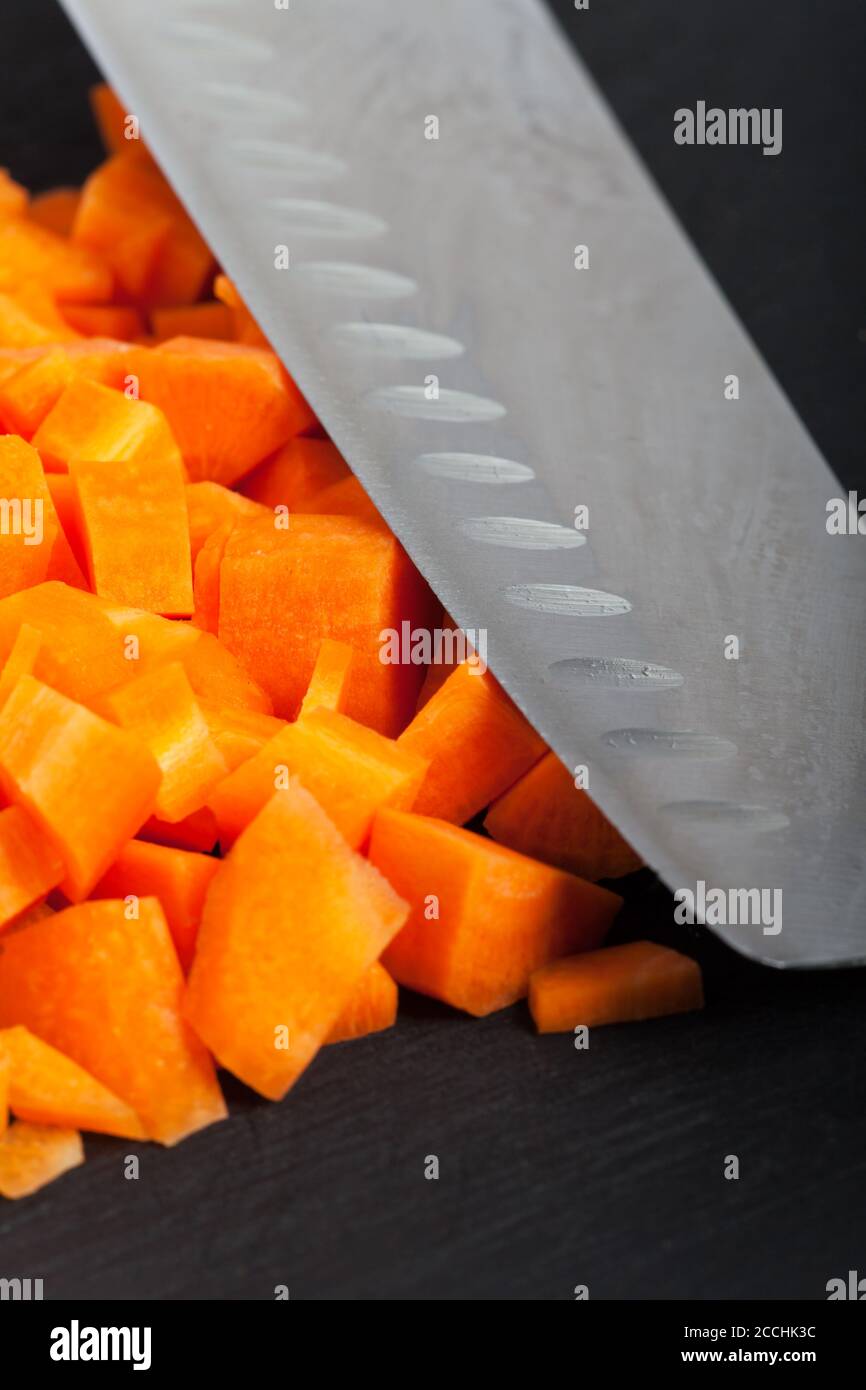 cut carrots and a blade Stock Photo - Alamy