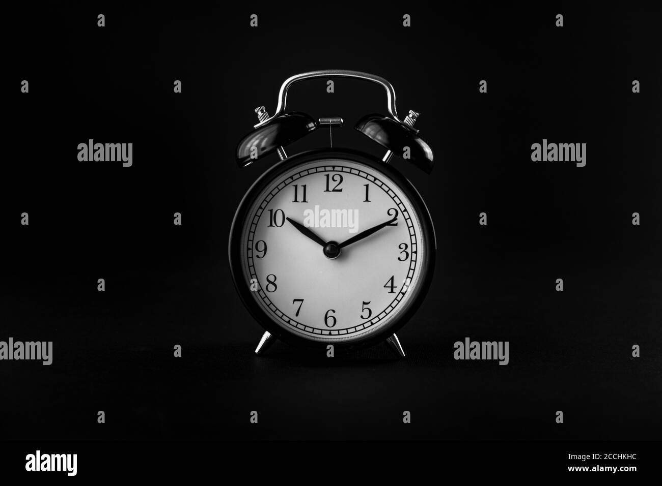 traditional low key alarm clock Stock Photo - Alamy