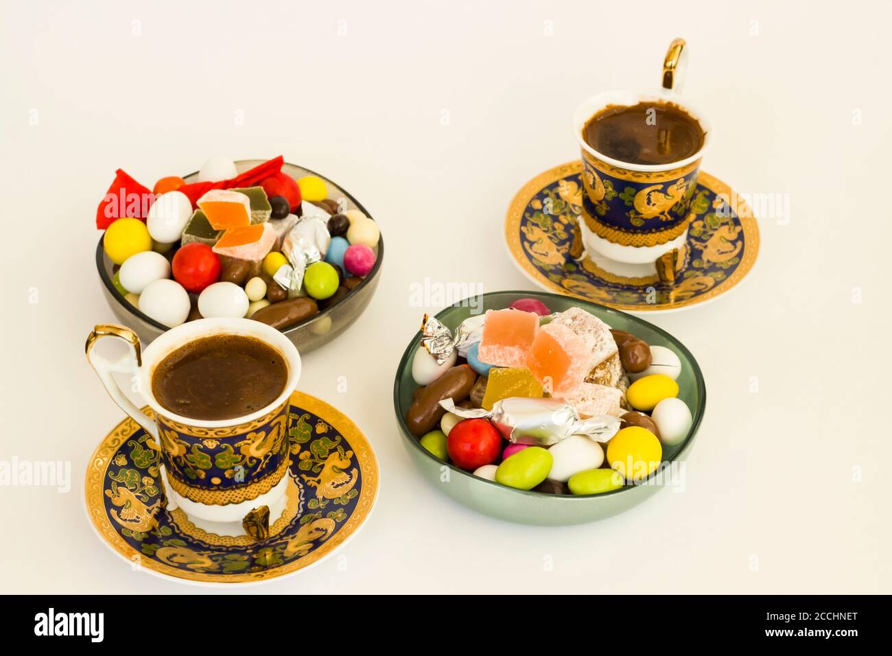Traditional Turkish Colorful candy and delight on white with coffee ...
