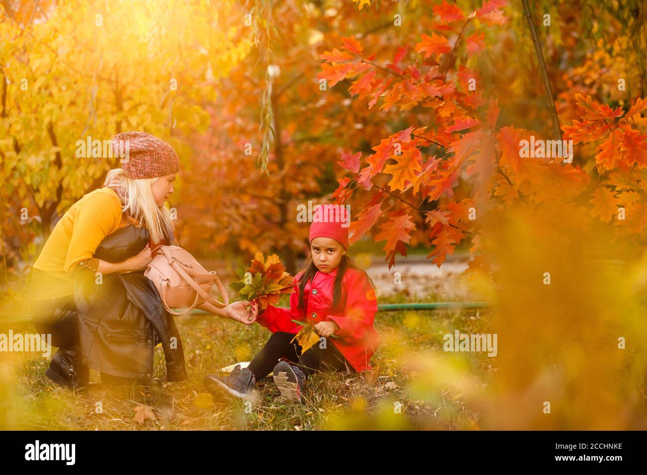 Parent take child to school. Pupil of primary school with backpack ...