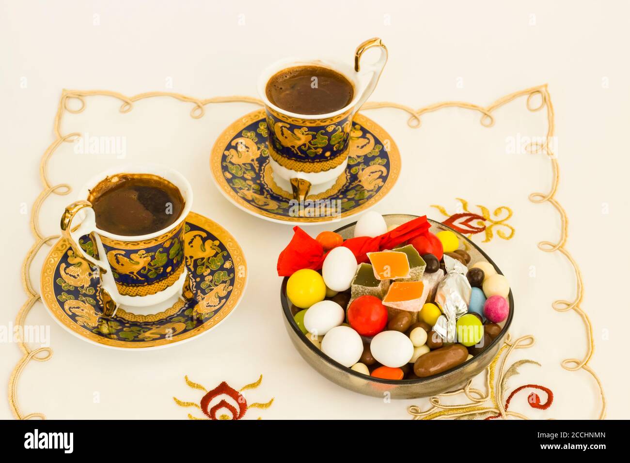 Traditional Turkish Colorful candy and delight on white with coffee ...