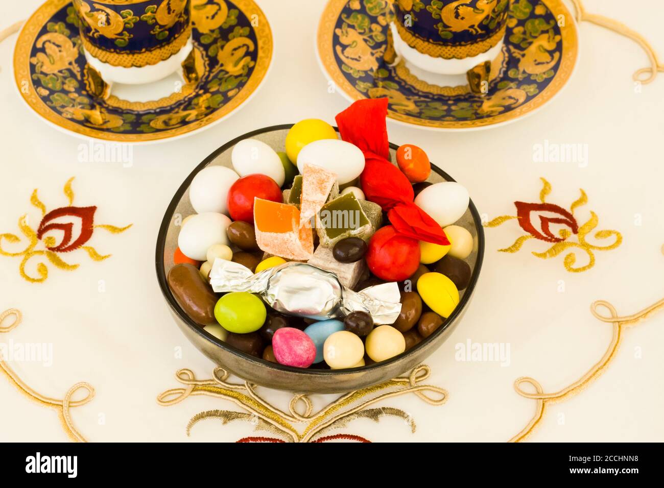 Traditional Turkish Colorful candy and delight on white with coffee ...