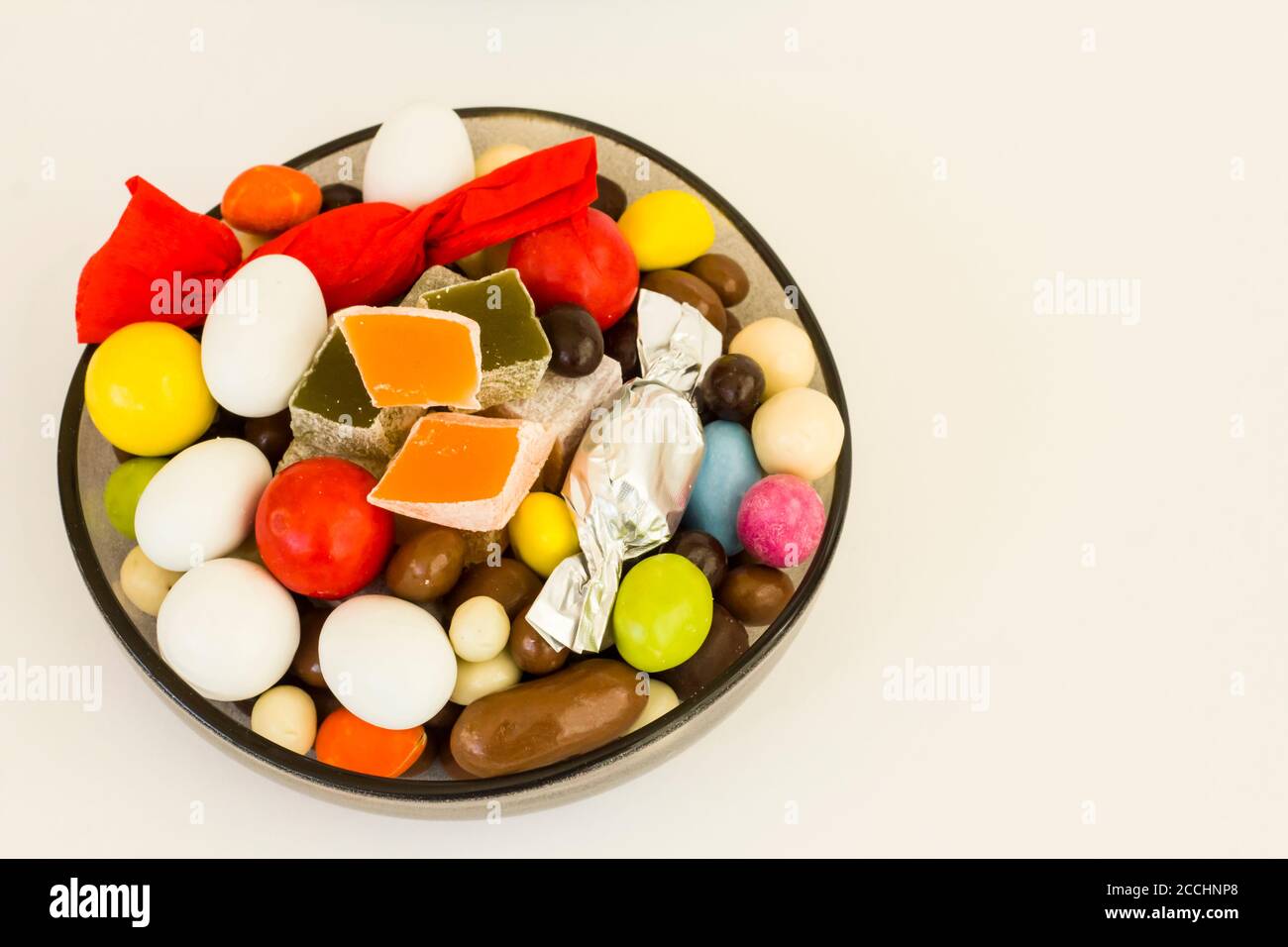 Traditional Turkish Colorful candy and delight on white with coffee ...