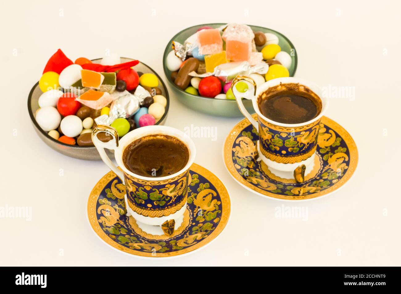 Traditional Turkish Colorful candy and delight on white with coffee ...