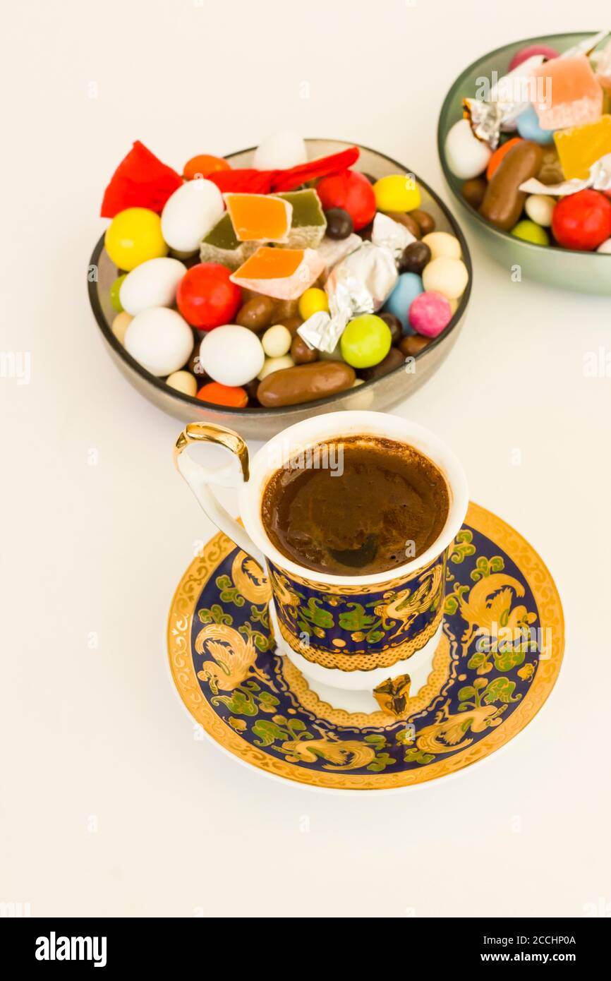 Traditional Turkish Colorful candy and delight on white with coffee ...